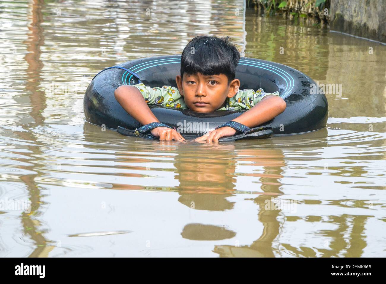Bandung Regency, West Java, Indonesia. 22nd Nov, 2024. A child plays in ...
