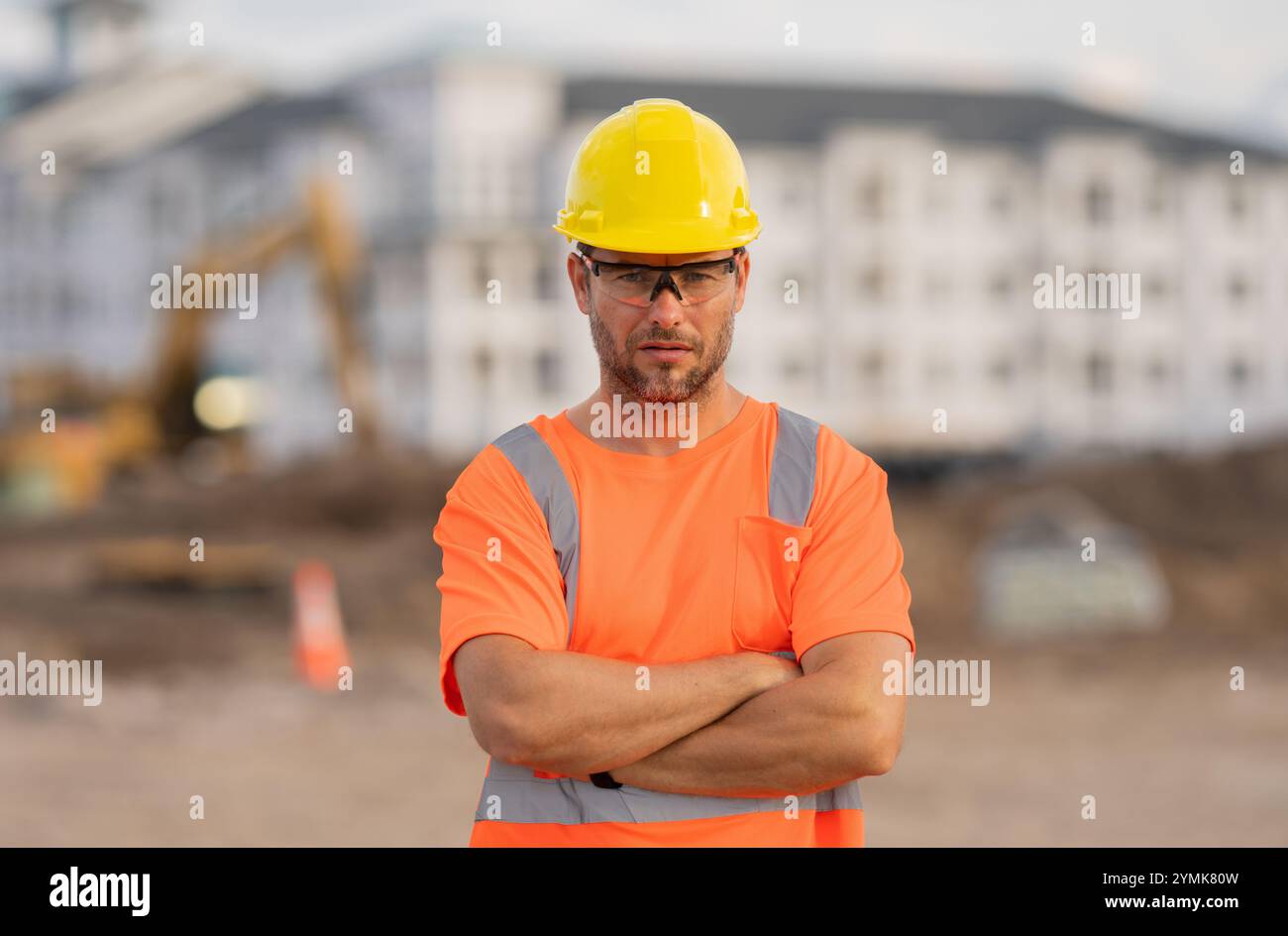 Hispanic 40 s worker builder on site construction. American middle aged ...