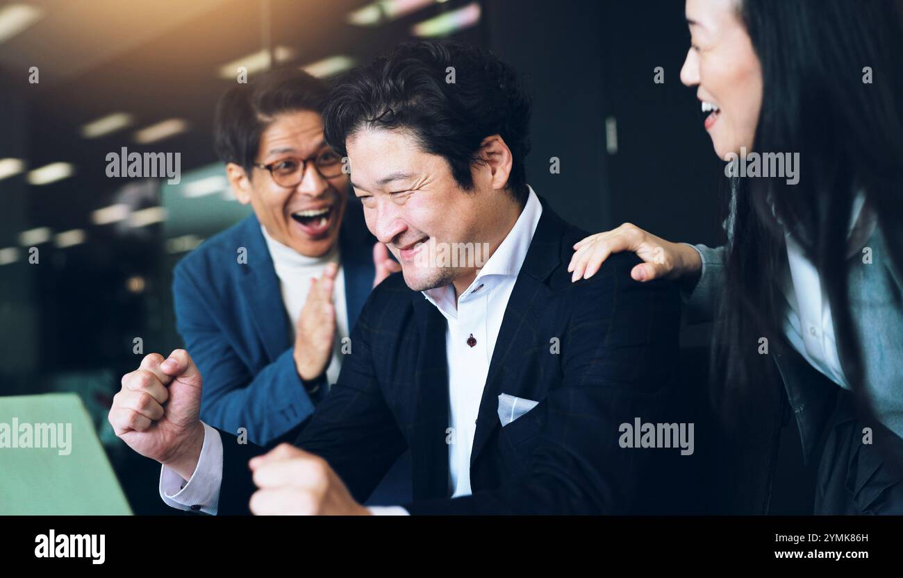 Japan, applause and business people with laptop, celebration and ...
