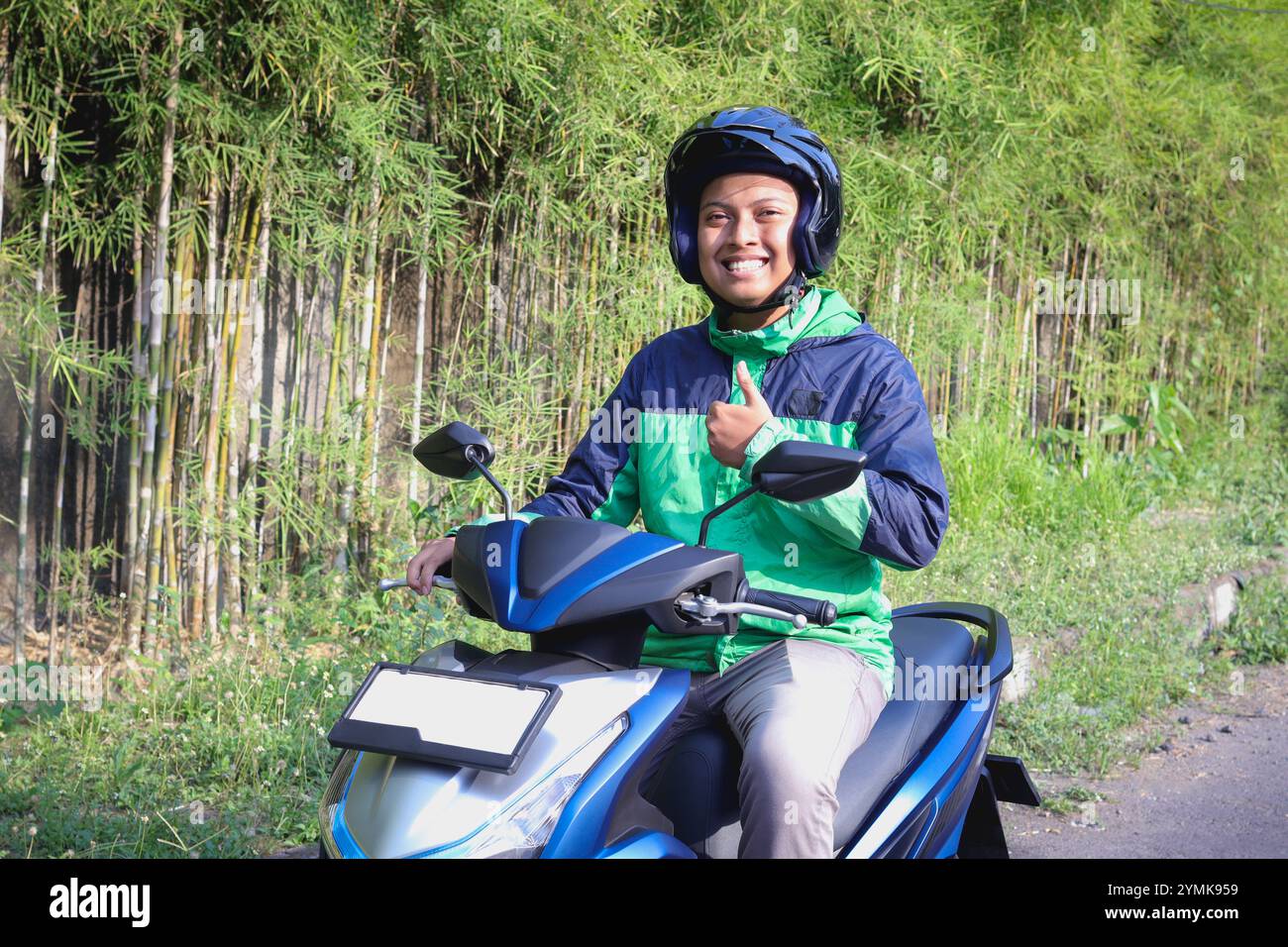 Vietnamese delivery rider hi-res stock photography and images - Alamy