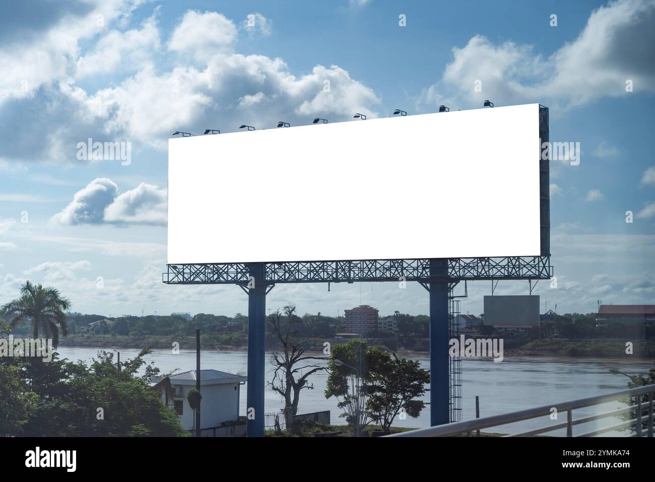 Blank billboard mockup on blue sky background for new advertisement ...