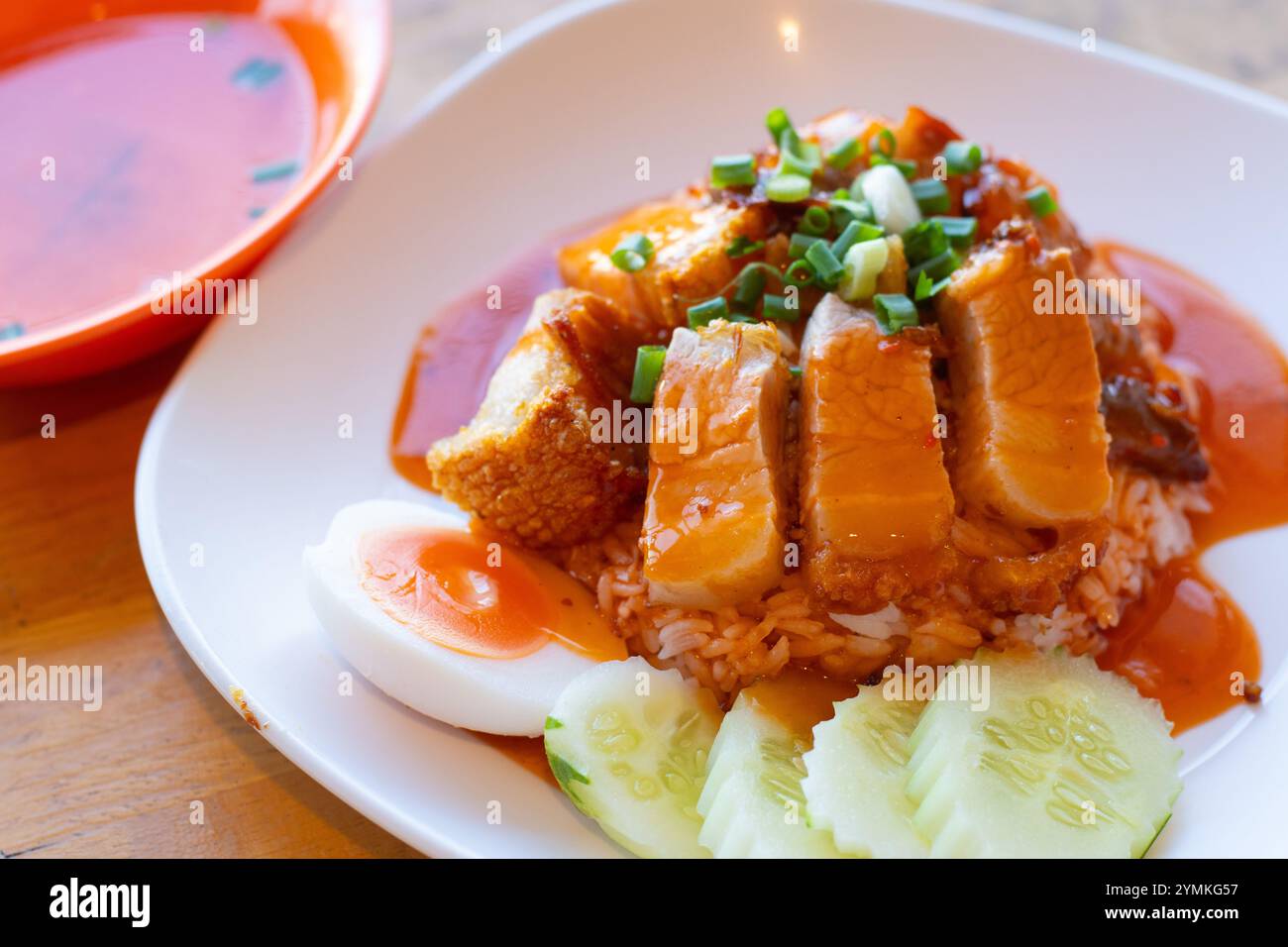 crispy pork belly on topped rice - Aisan food style Stock Photo - Alamy