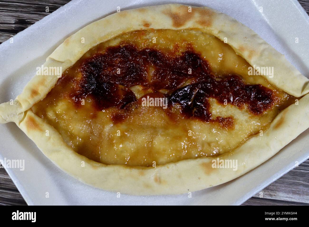 Clotted creamy dairy and halva Chakhtoura, A sweet baked pastry, baked ...