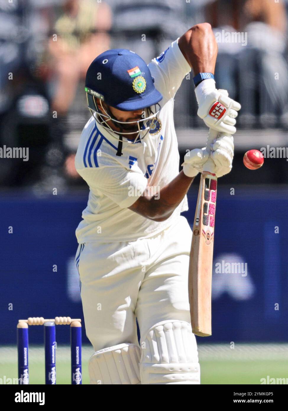 India's Nitish Kumar Reddy bats during play in the first cricket test ...