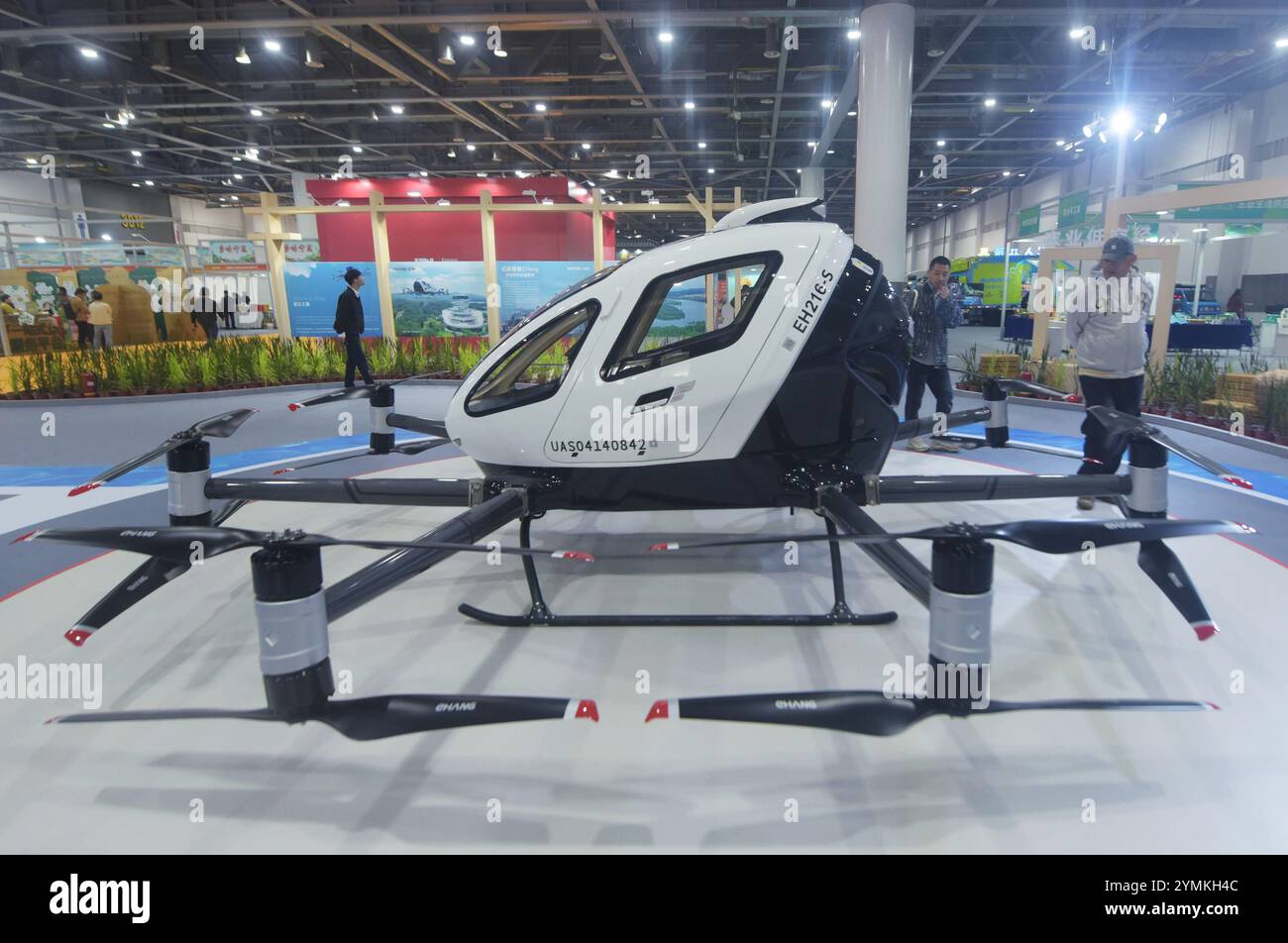 Citizens look at the EH216-S electric Vertical Take-off and Landing ...