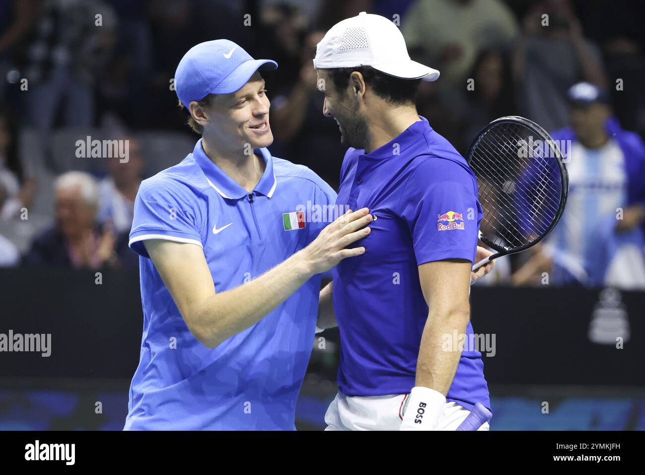 Matteo Berrettini (white cap) and Jannik Sinner (blue cap) of Italy ...