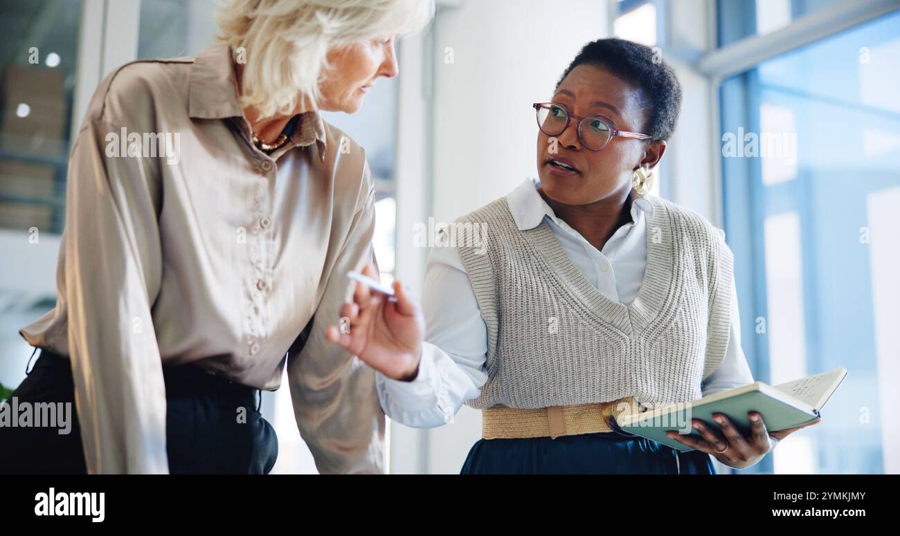 Teamwork, business and women in office, notebook and conversation with ...