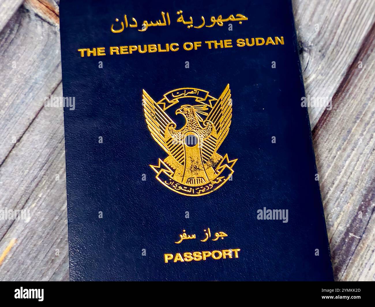 The Republic of Sudan passport with a gilded falcon in the center of ...
