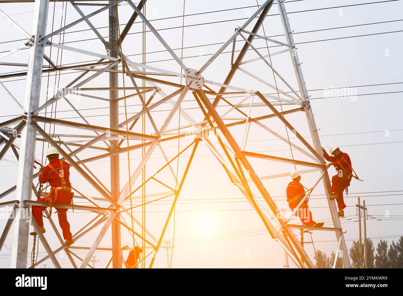 The workers of the pylon Stock Photo - Alamy