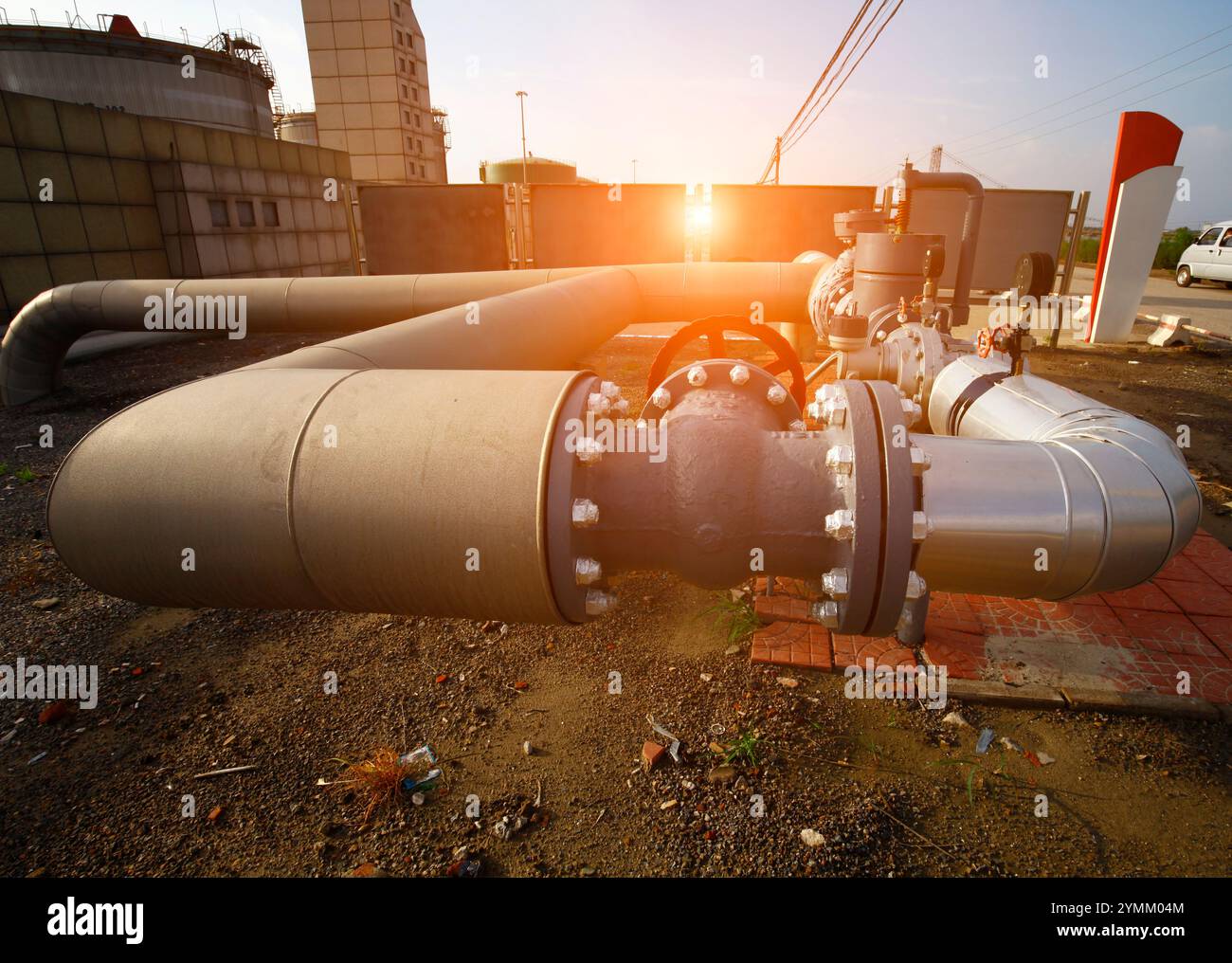 Oil pipes and valves Stock Photo - Alamy