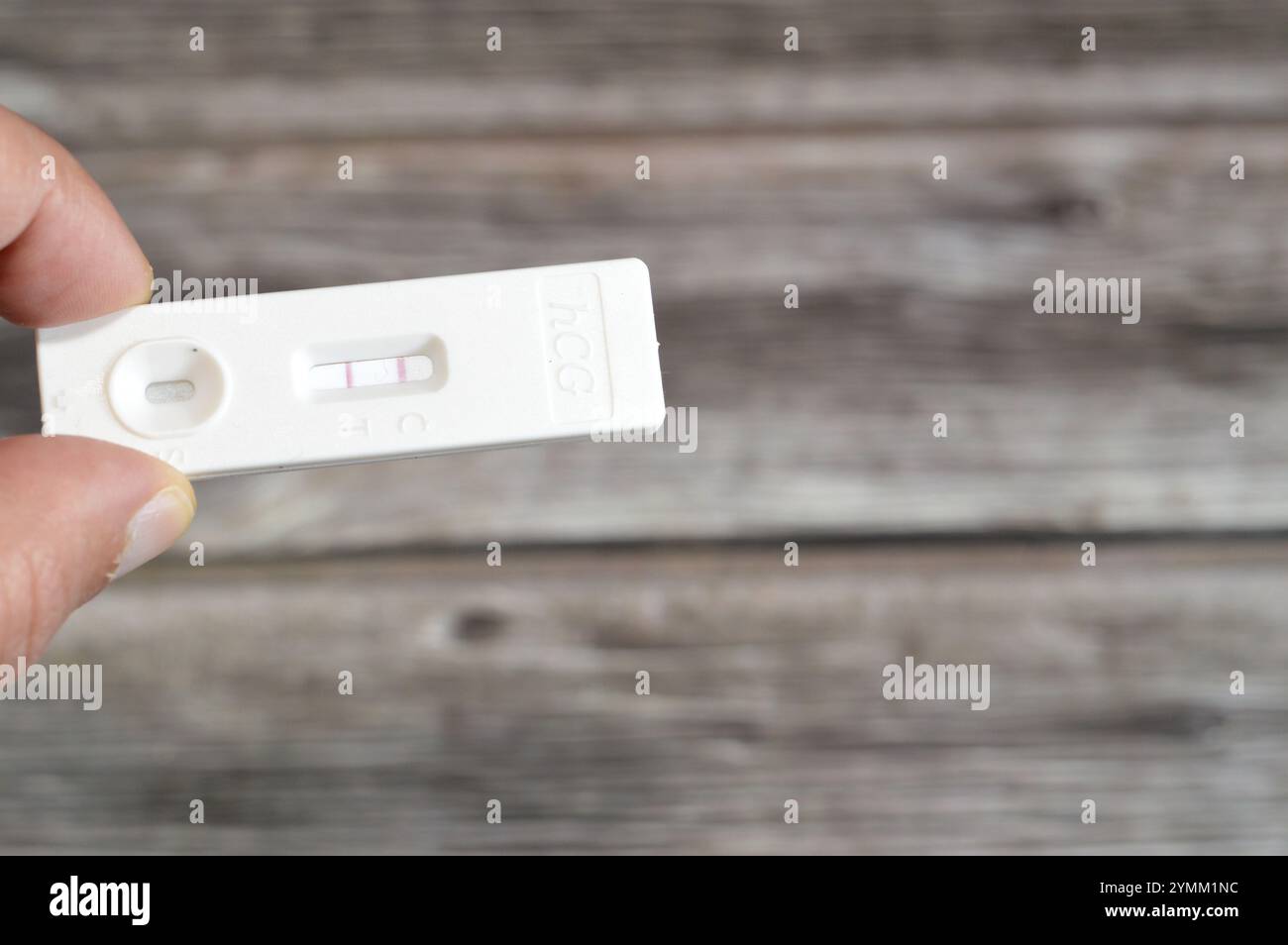 A Positive result of rapid urine pregnancy test, detecting human ...