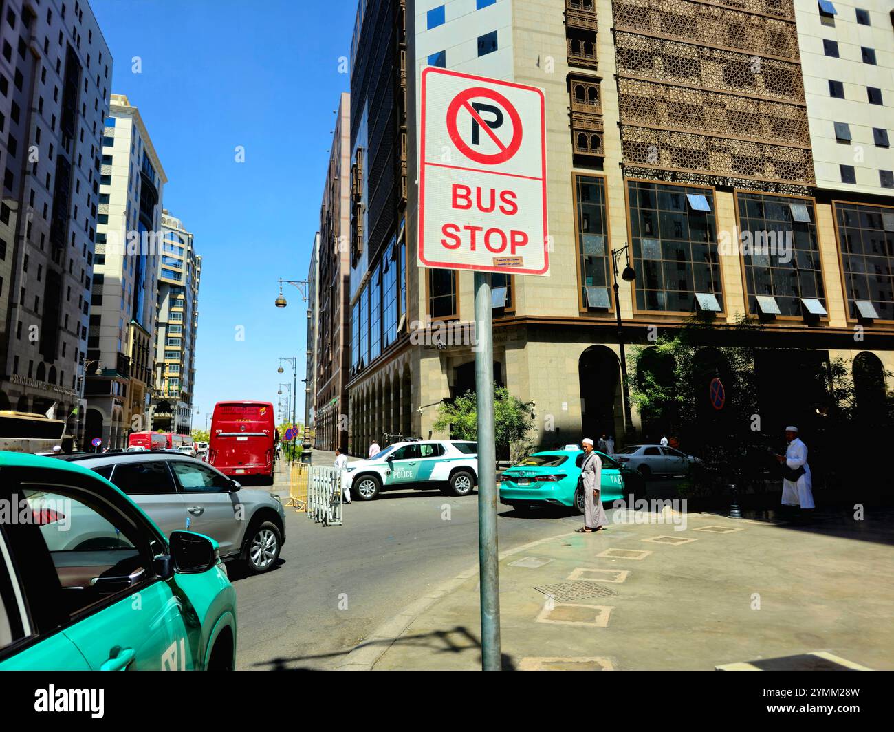 Medina, Saudi Arabia, June 28 2024: A bus stop sign with a no parking ...