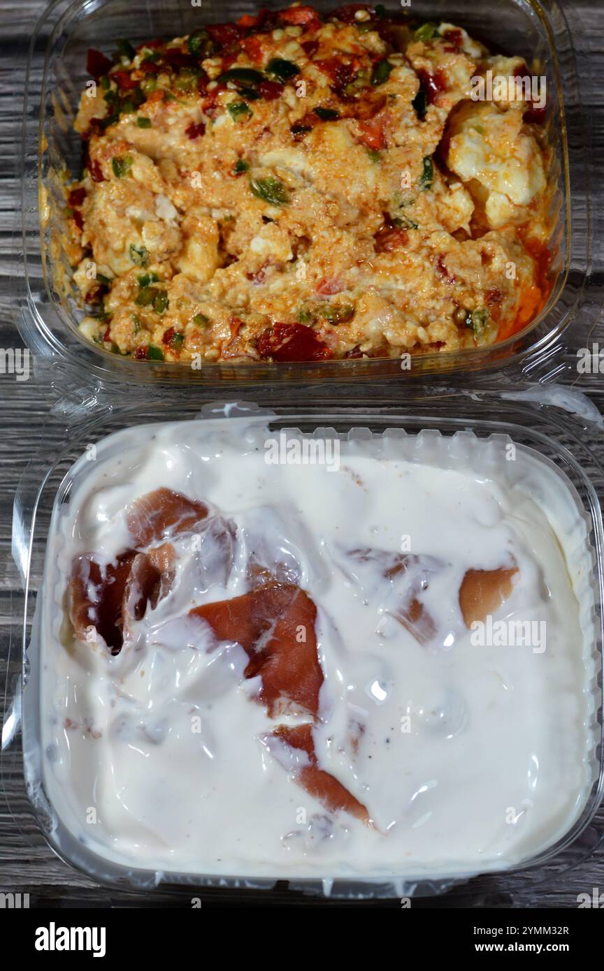 Background of Egyptian barrel Baramily cheese with slices of red and ...