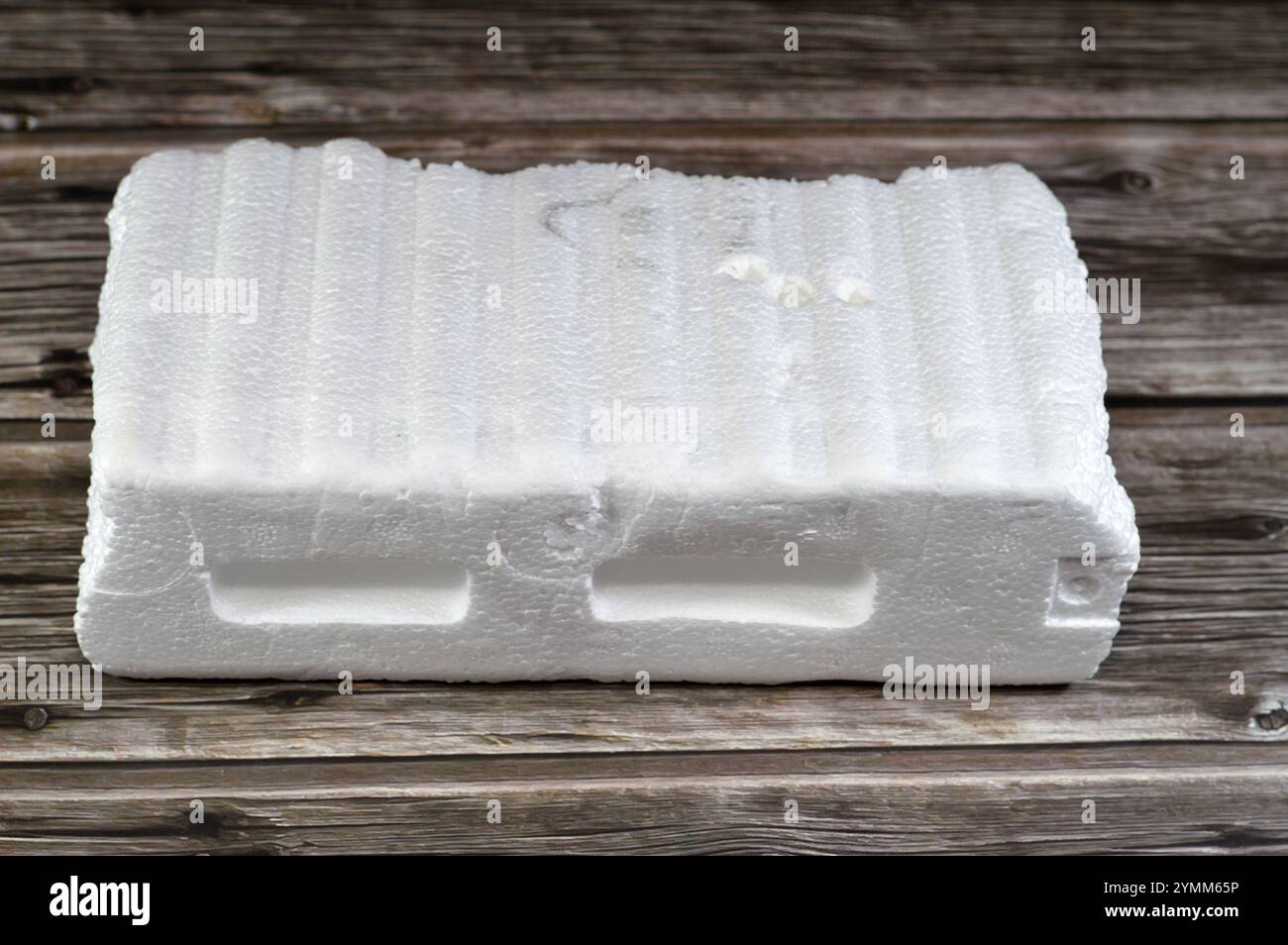 Polystyrene PS, a synthetic polymer made from monomers of the aromatic ...