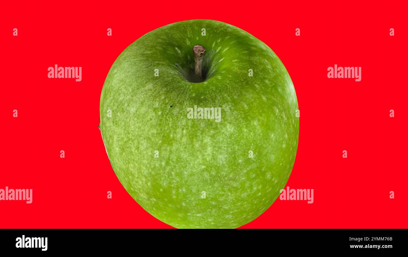 green apple with red background Stock Photo - Alamy