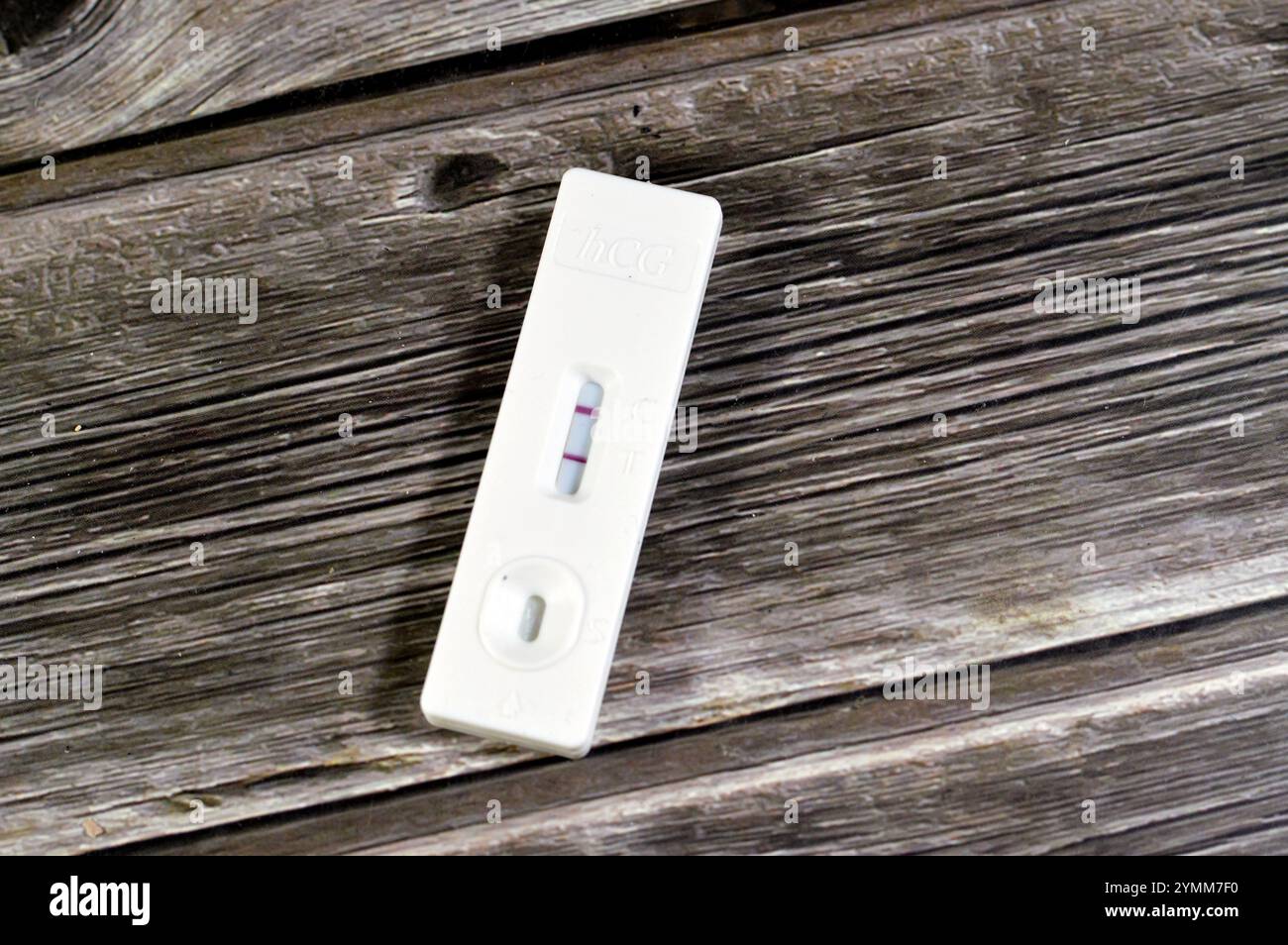 A Positive result of rapid urine pregnancy test, detecting human ...