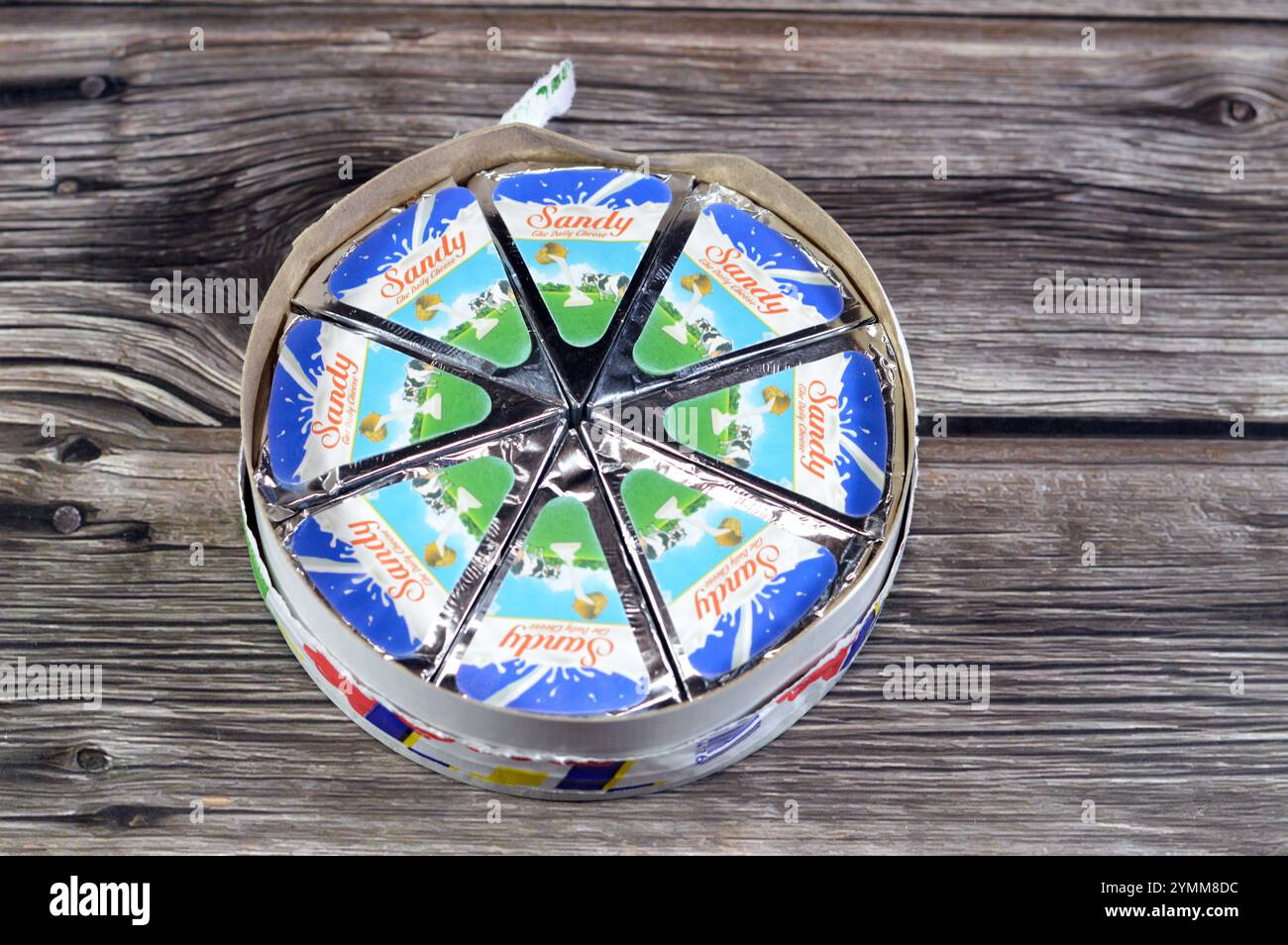 Cairo, Egypt, November 5 2024: Sandy triangle cheese pieces used as a ...