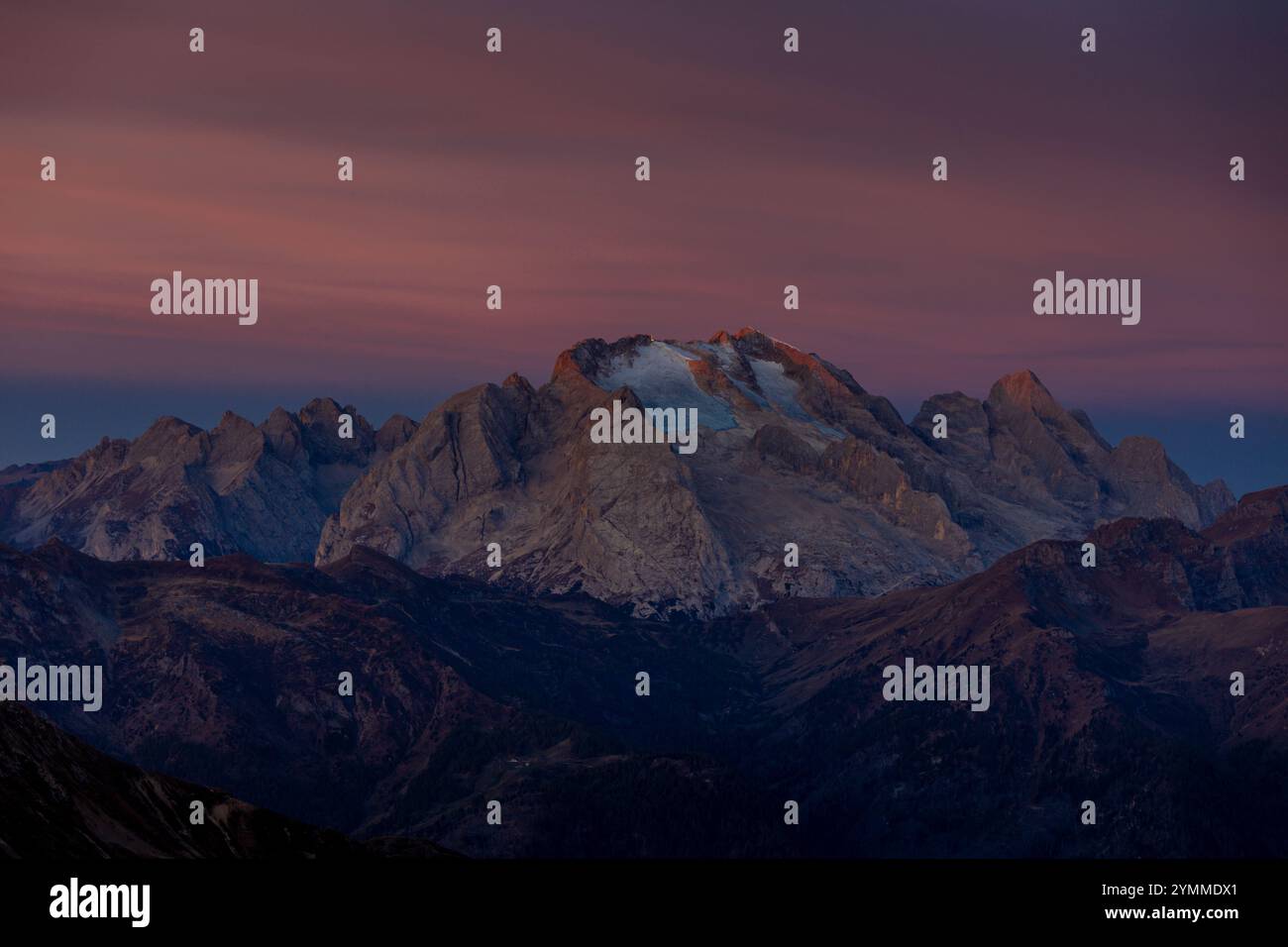 Sunset in the mountains. Red and orange burning sky horizon behind the ...