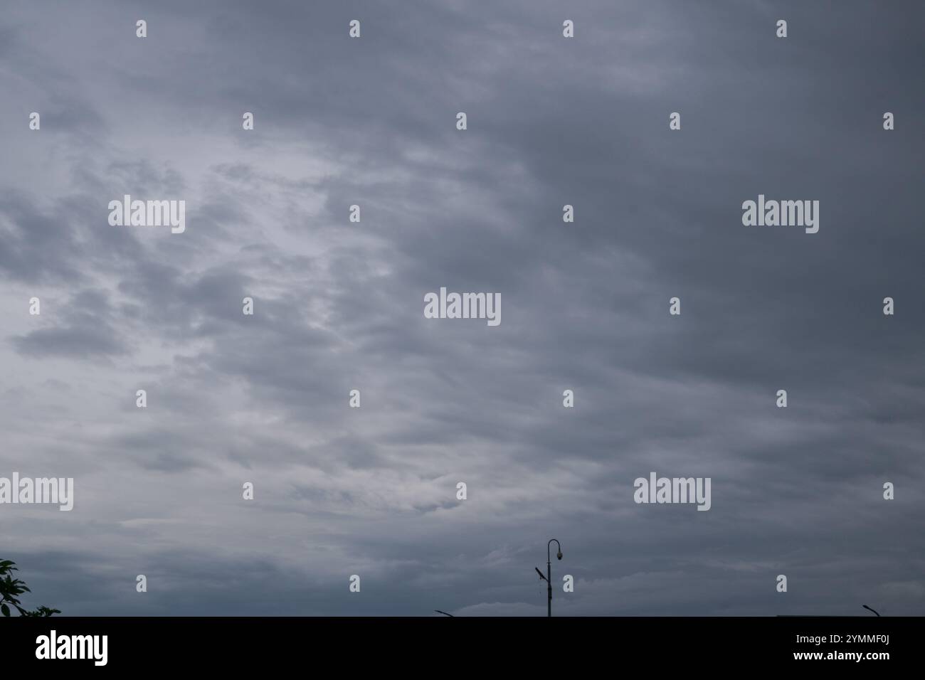 Cloudy clouds in the sky look dramatic Stock Photo - Alamy