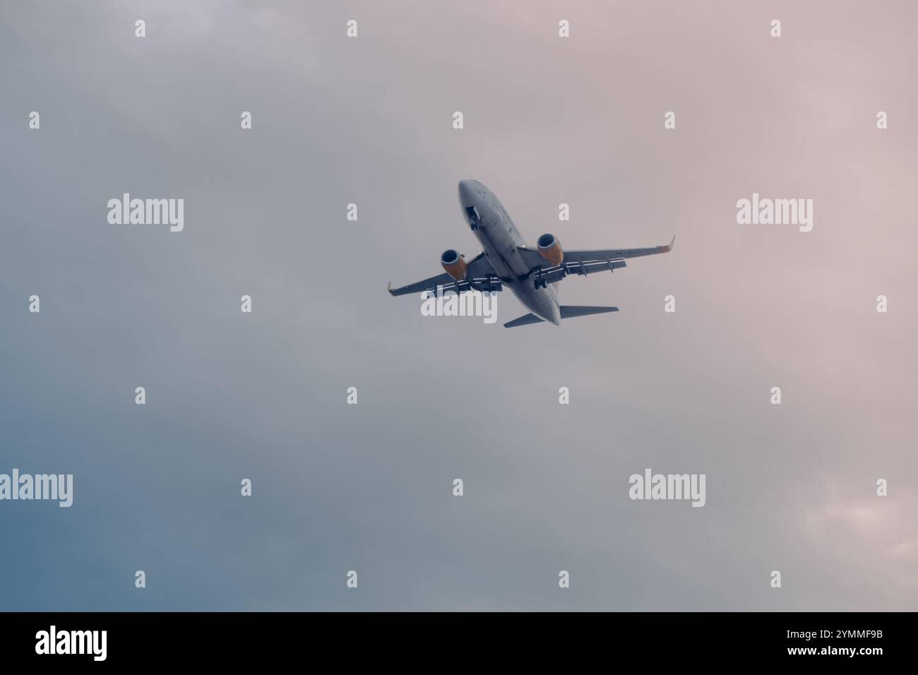 Black Stone Airlines Cargo Plane preparing to land Crossing Blue clouds ...