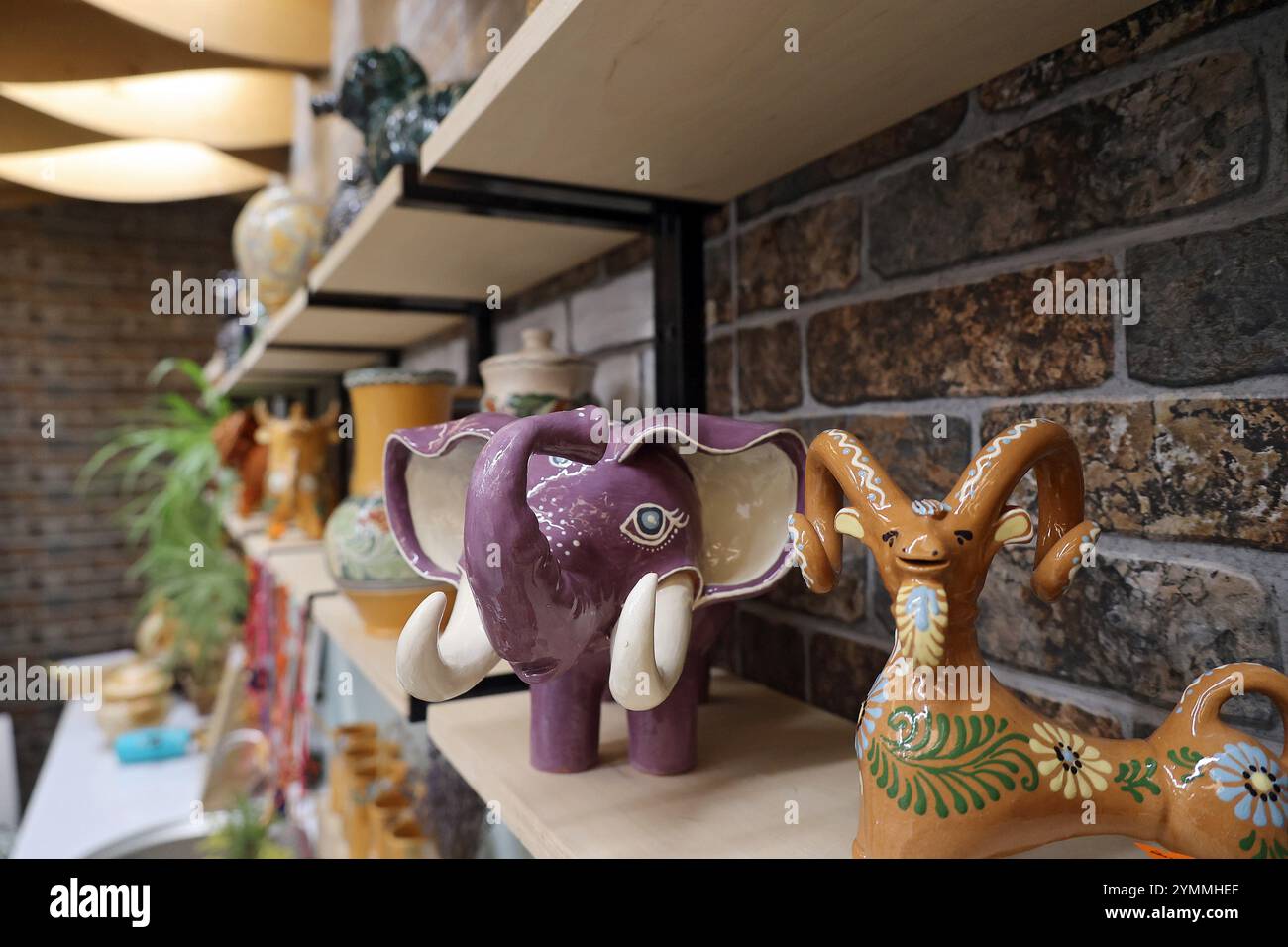 MALI BUDYSHCHI, UKRAINE - NOVEMBER 19, 2024 - Animal figurines made by ...