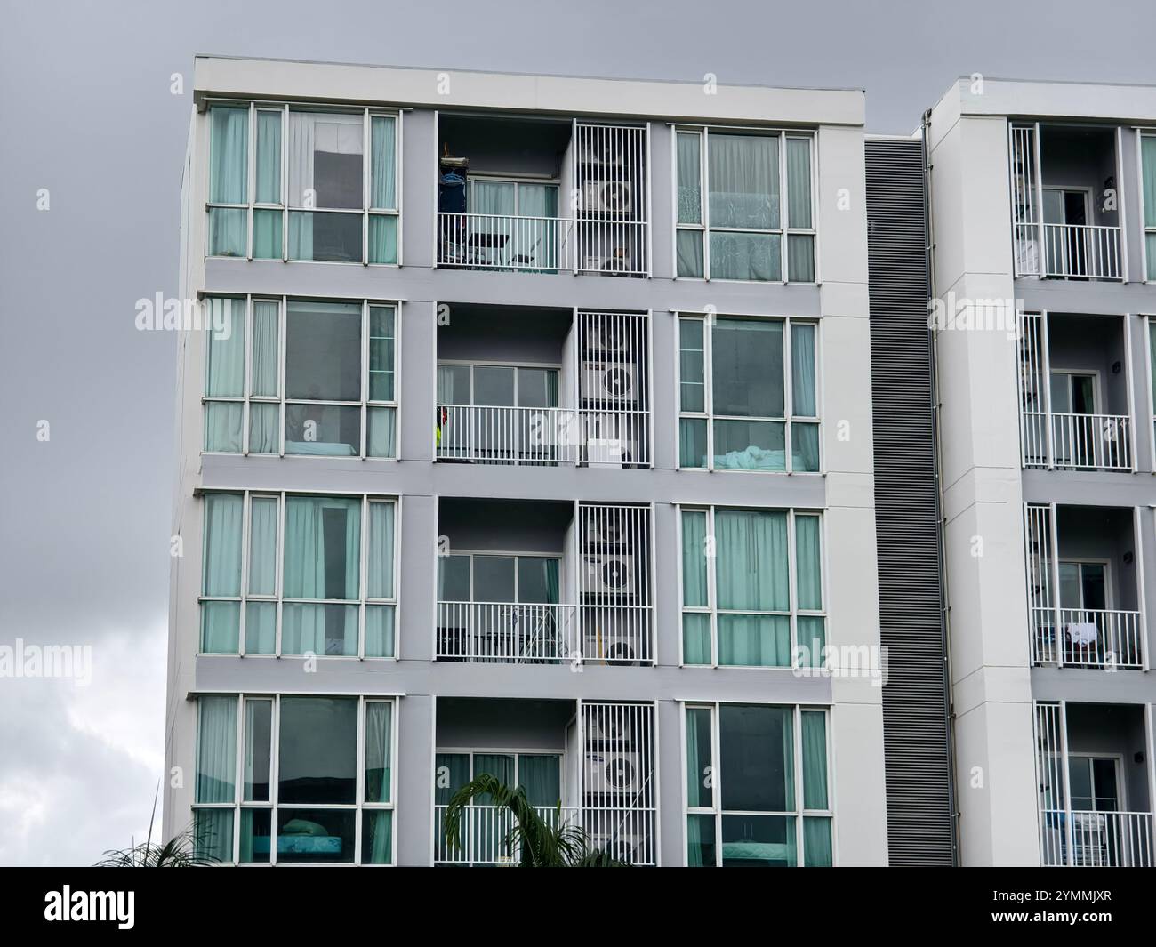 Detailed view of windows, doors and balconies of city buildings Stock ...