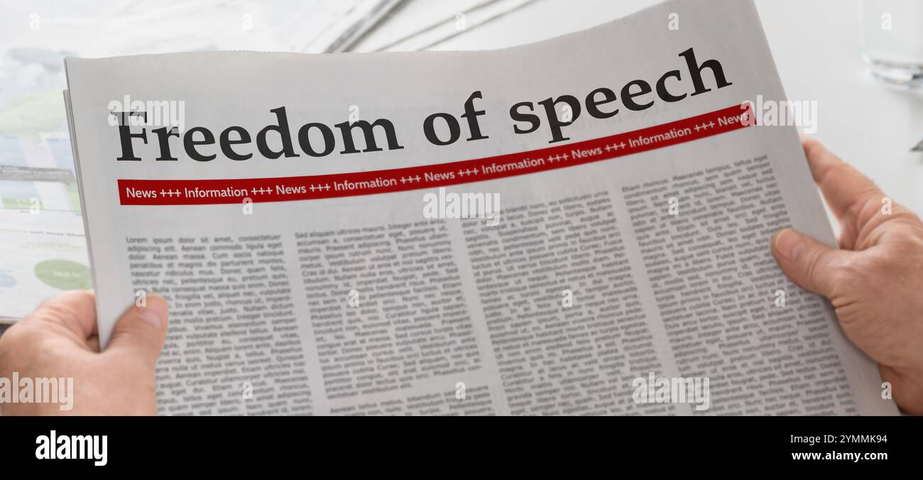 Newspaper with the headline Freedom of speech Stock Photo - Alamy