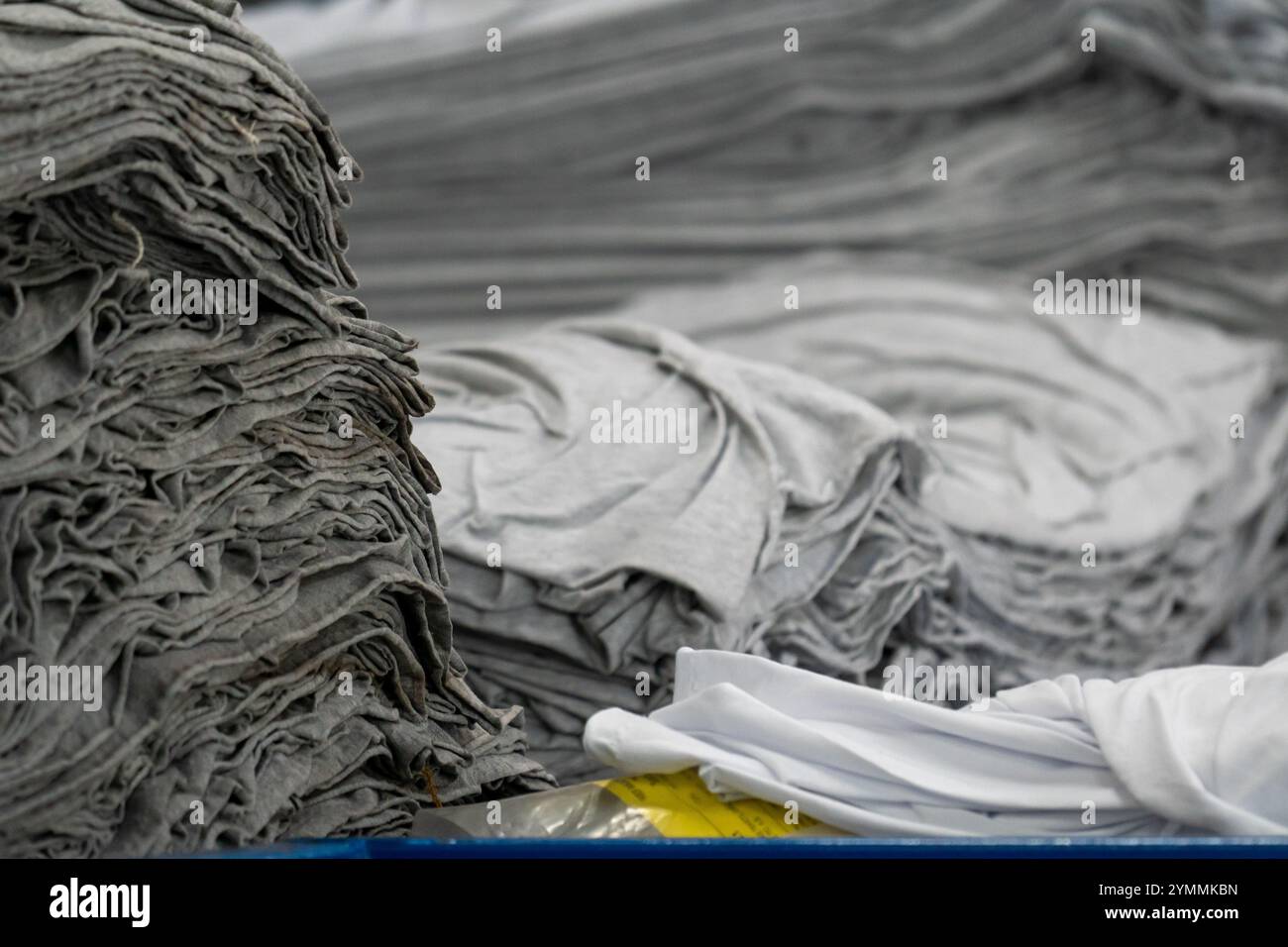 A stack of fabric in a textile factory warehouse in close up view Stock ...