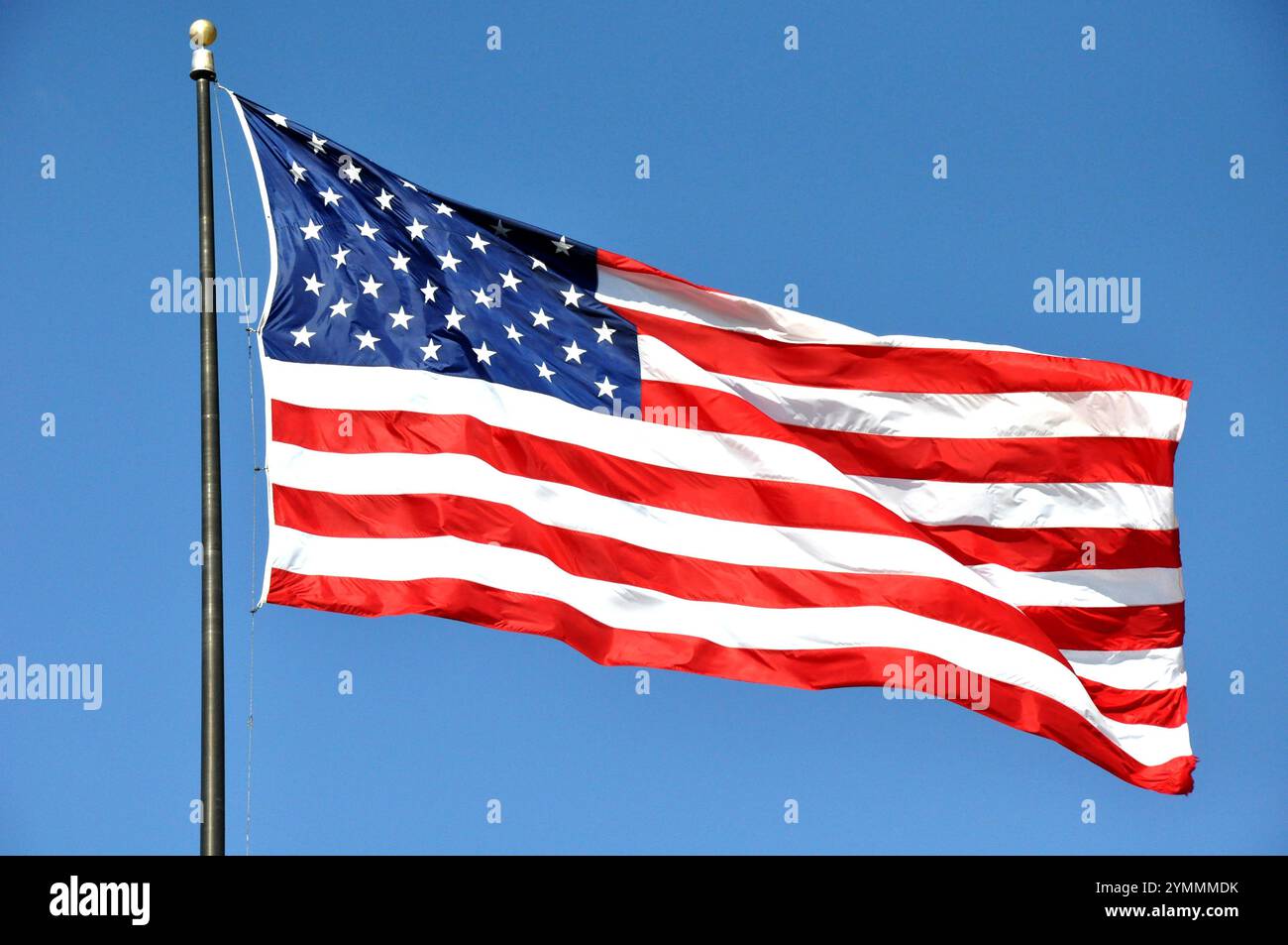 American flag fluttering hi-res stock photography and images - Alamy