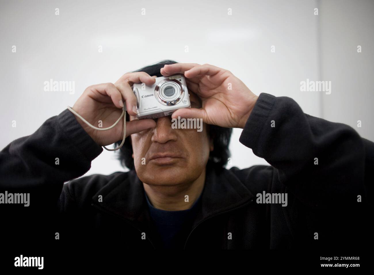 A blind student takes a pictureÃ‚Â during a photography workshop for ...