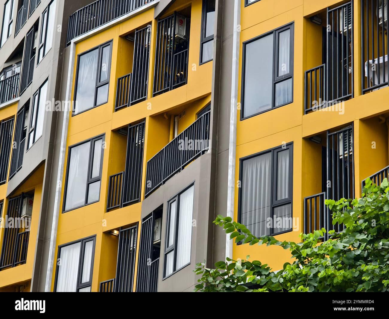 Detailed view of windows, doors and balconies of city buildings Stock ...