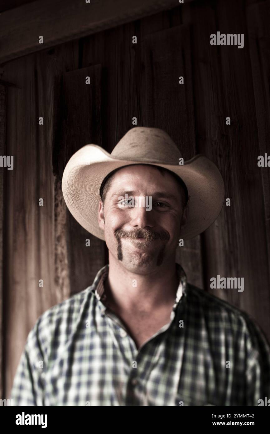 A portrait of a cowboy on a cattle ranch in Montana Stock Photo - Alamy