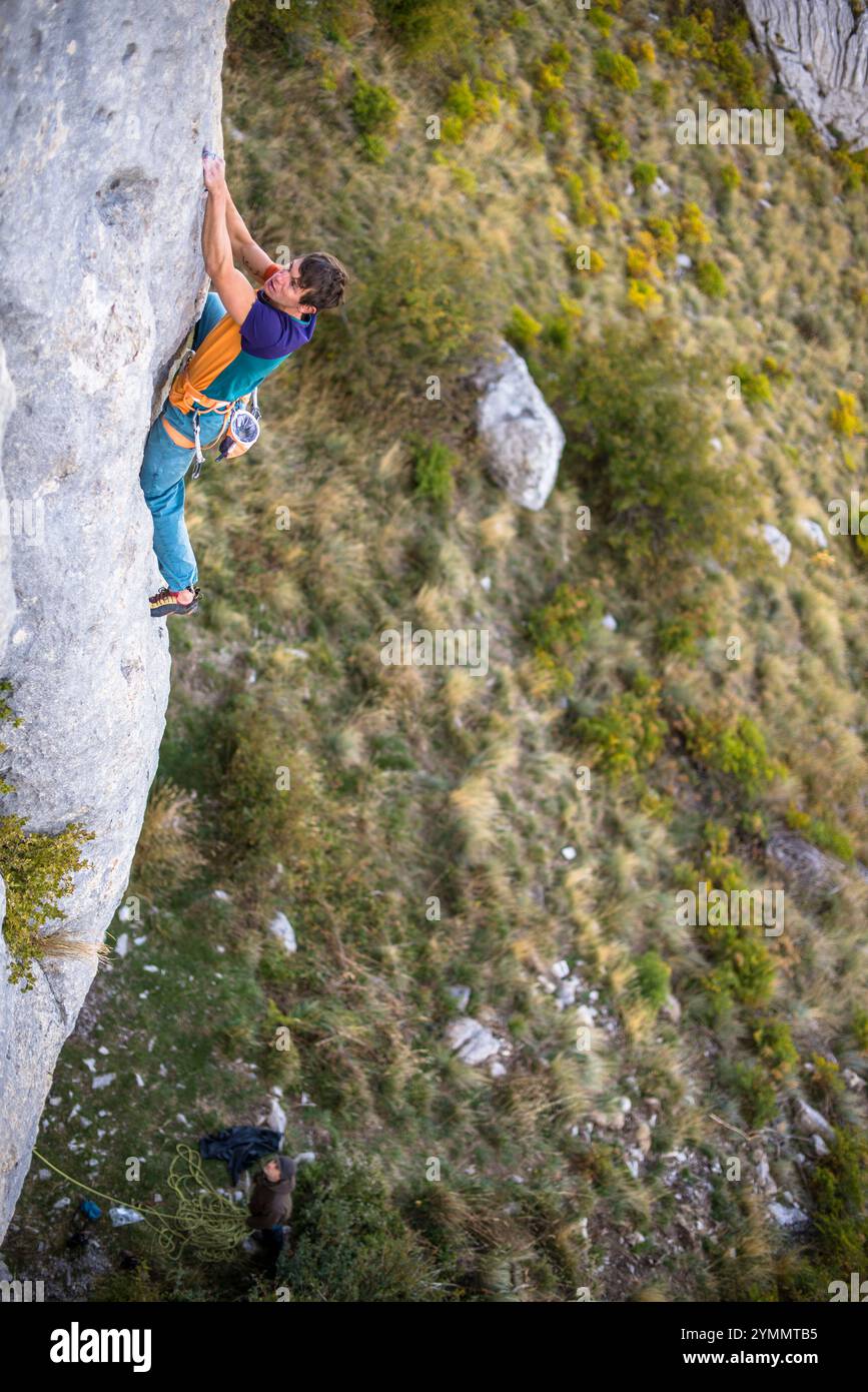 Men climbing a sport route on limestone in Ceuse, France Stock Photo ...