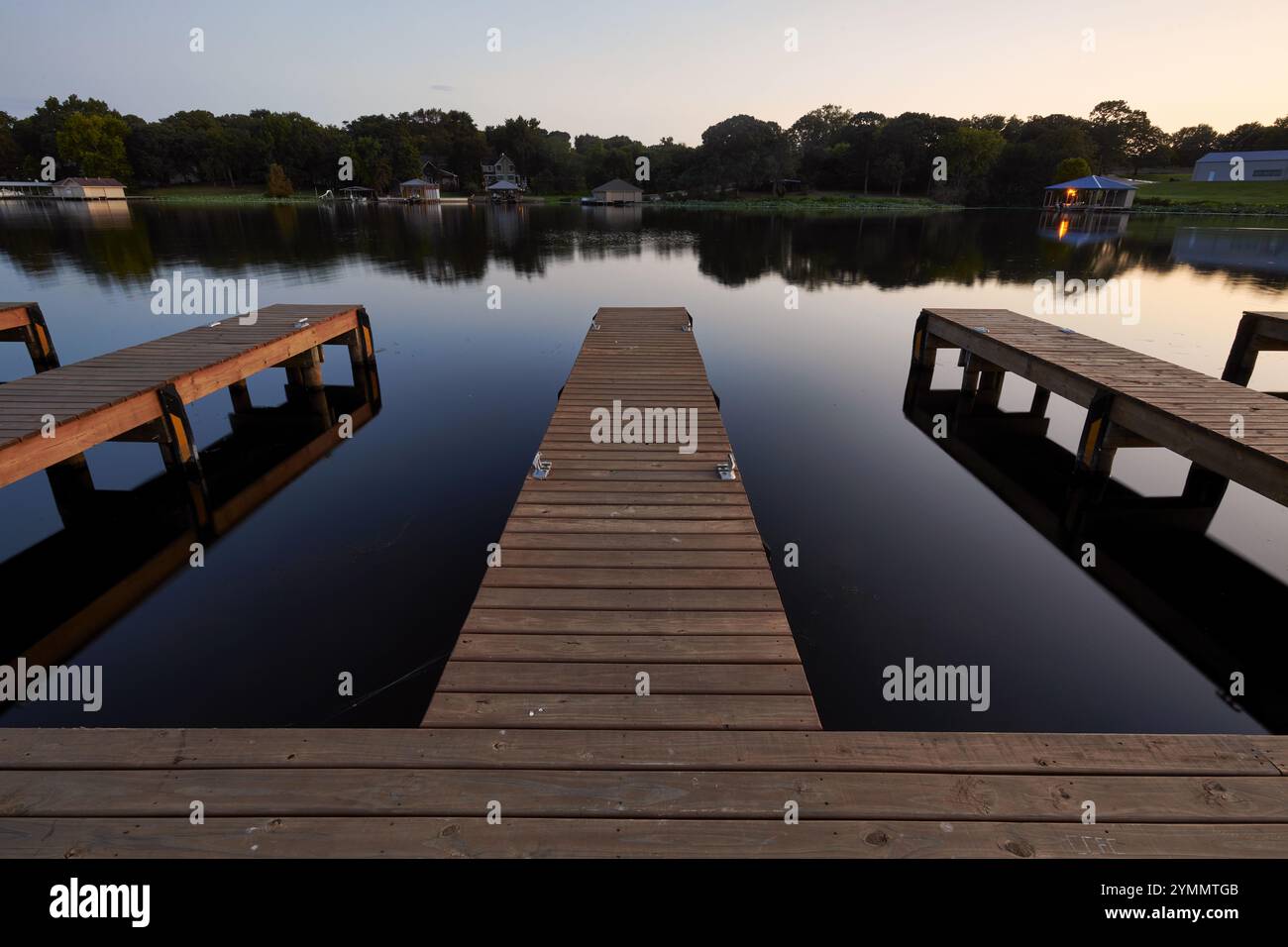 Empty boat docks on a lake Stock Photo - Alamy