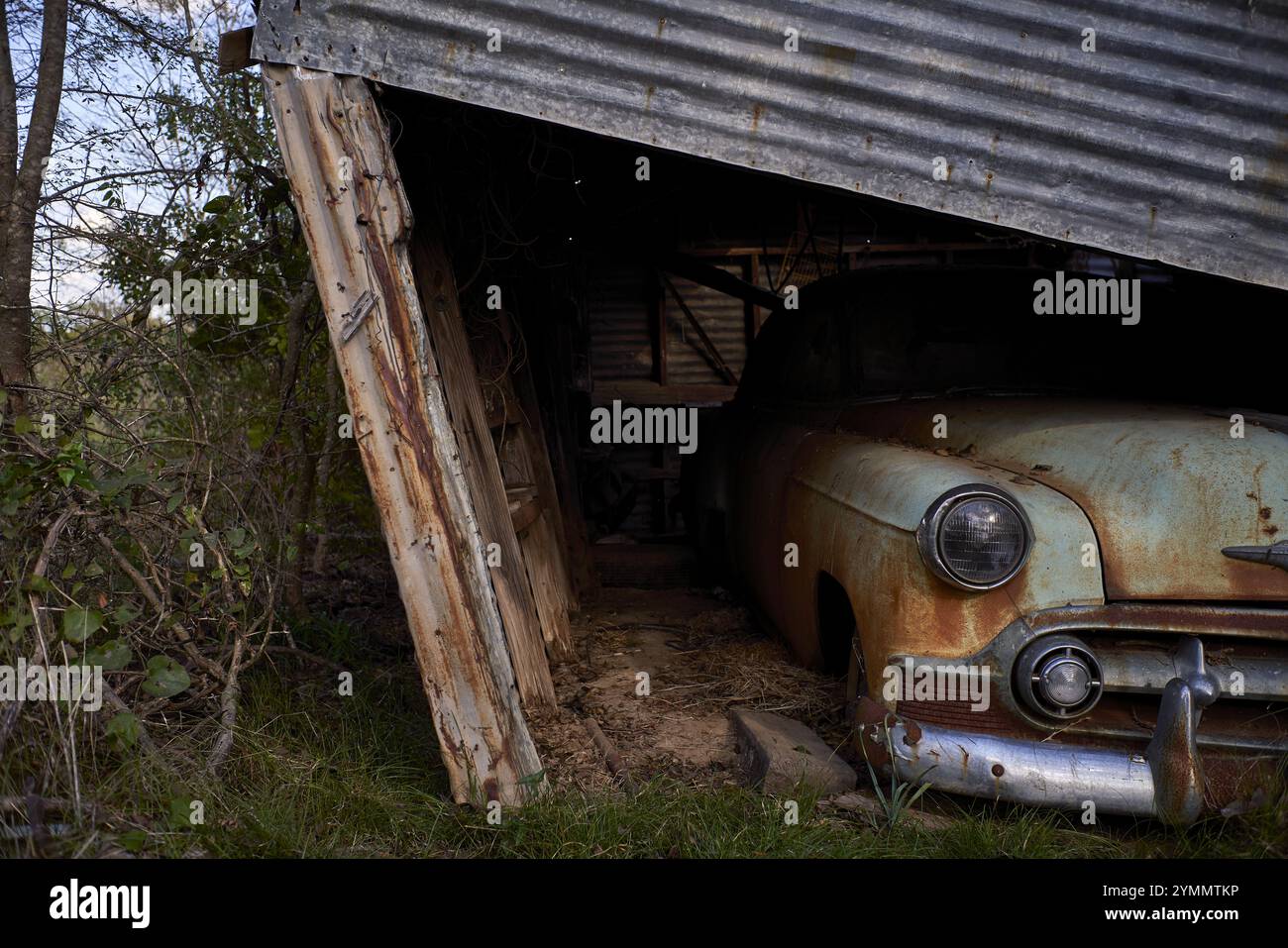 Antique green Car and Barn Stock Photo - Alamy