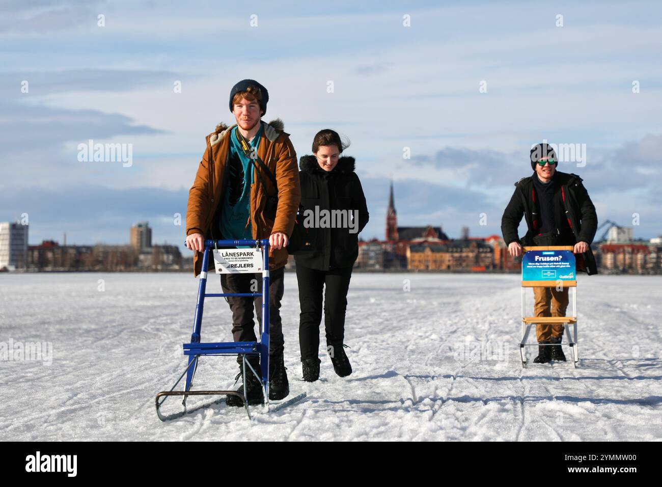 People walk on the ice on Lulea's Isbanan in the Swedish Lapland. Lulea ...