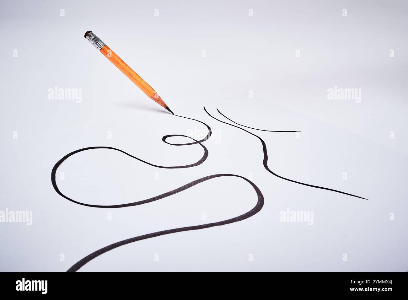 Pencil drawing a swirling line Stock Photo - Alamy
