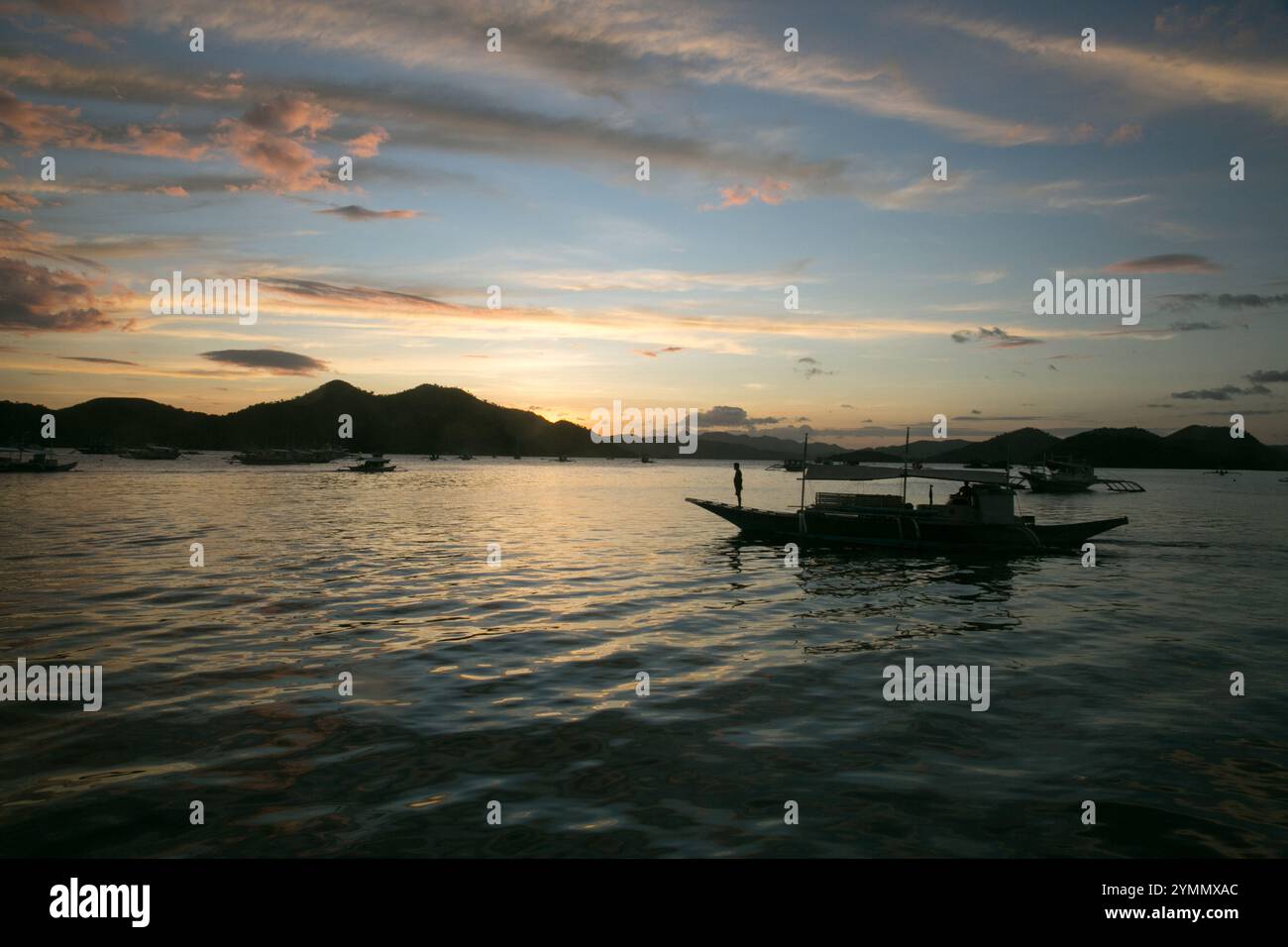 Sunset at the sea in Coron, Phillippines Stock Photo - Alamy