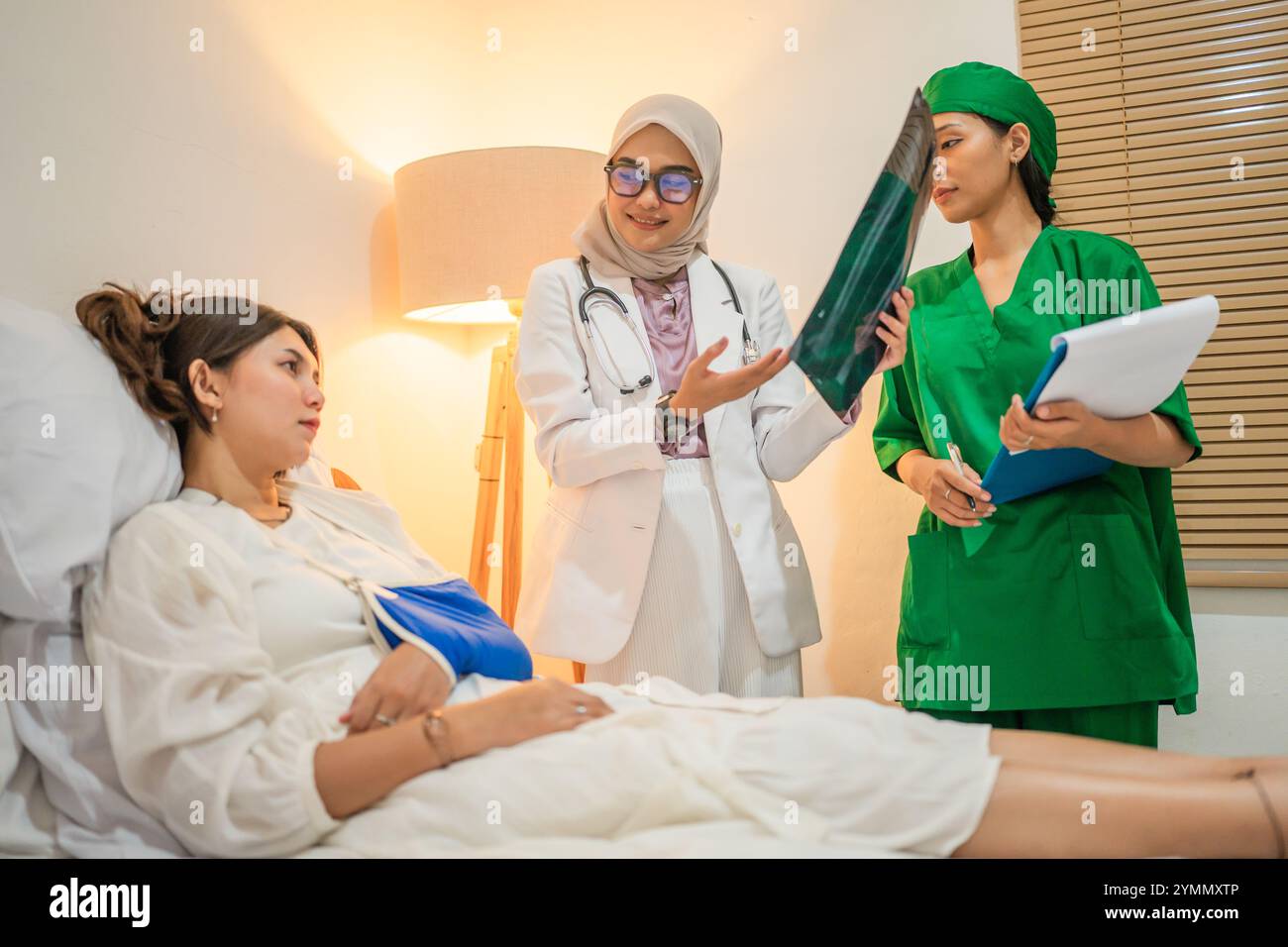 A doctor and nurse discuss patient care, focusing on health and ...