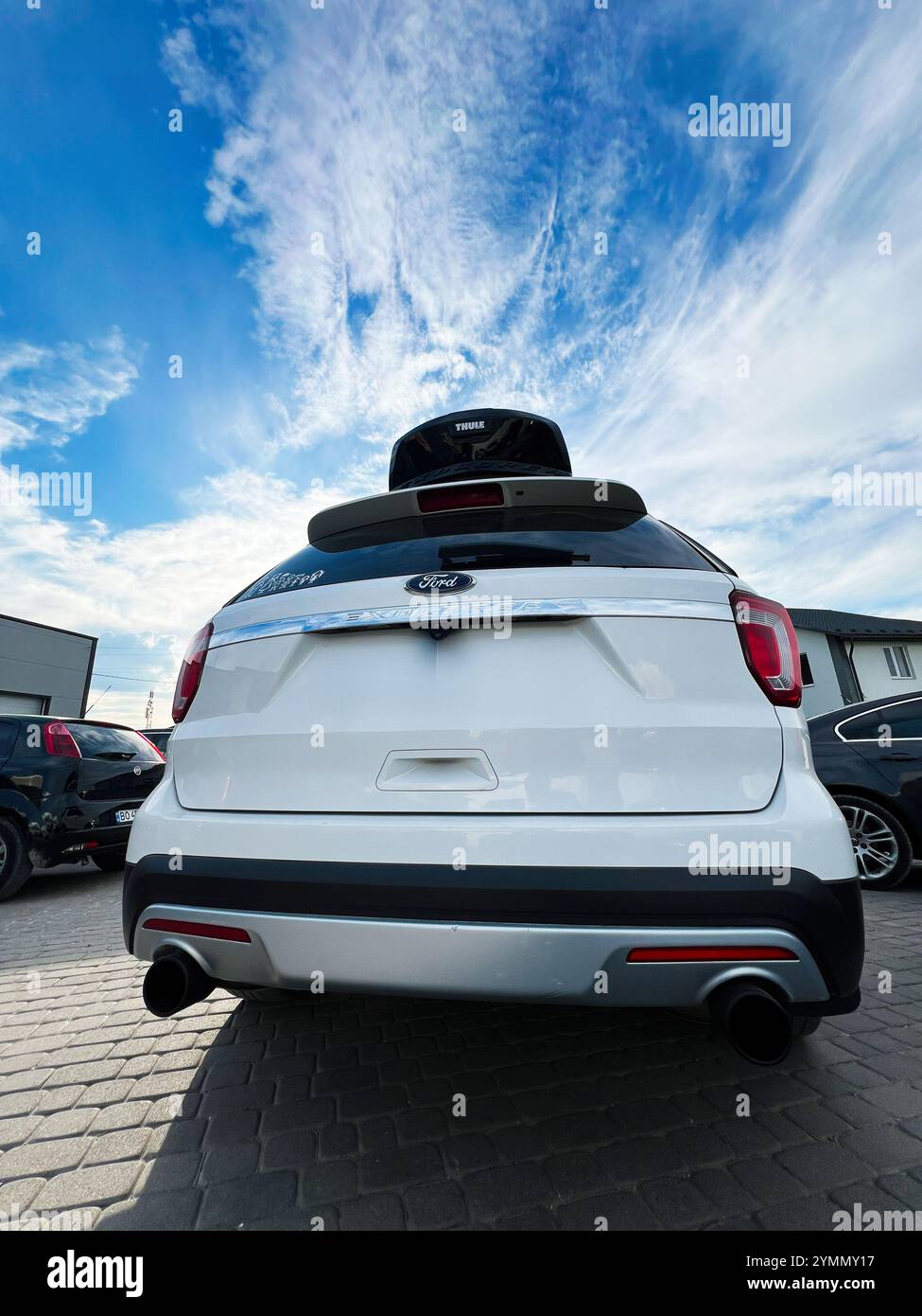 Kyiv, Ukraine - November 22, 2024: A white Ford Explorer car with a ...