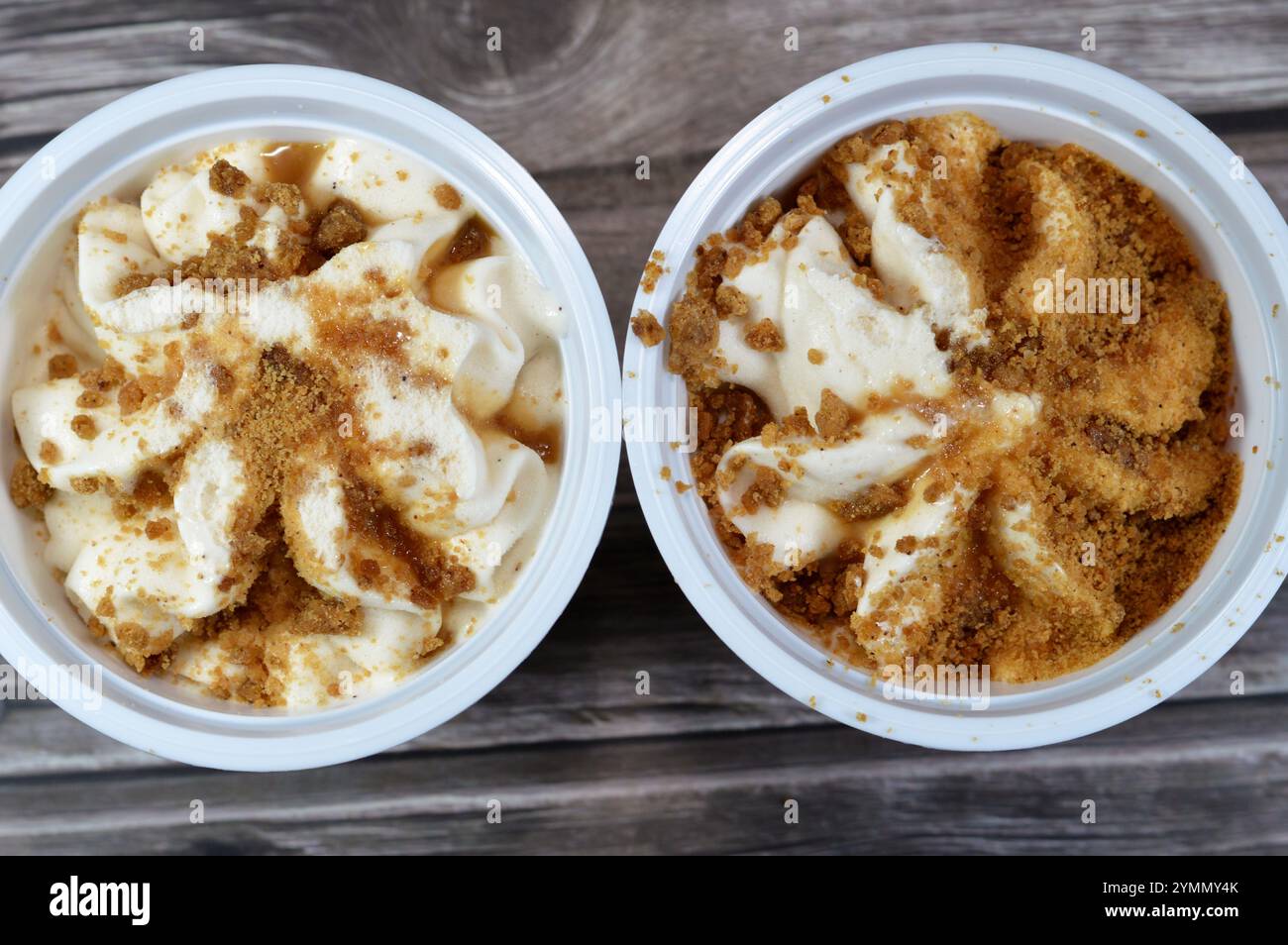 Caramel biscuit and vanilla ice cream, pieces of biscuits rich in ...