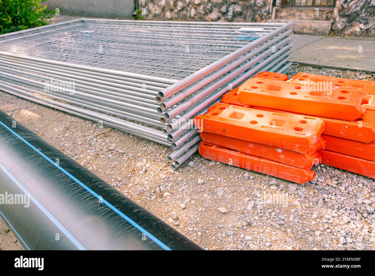 Pile, heap of galvanized parts for temporary metal fence panels are ...