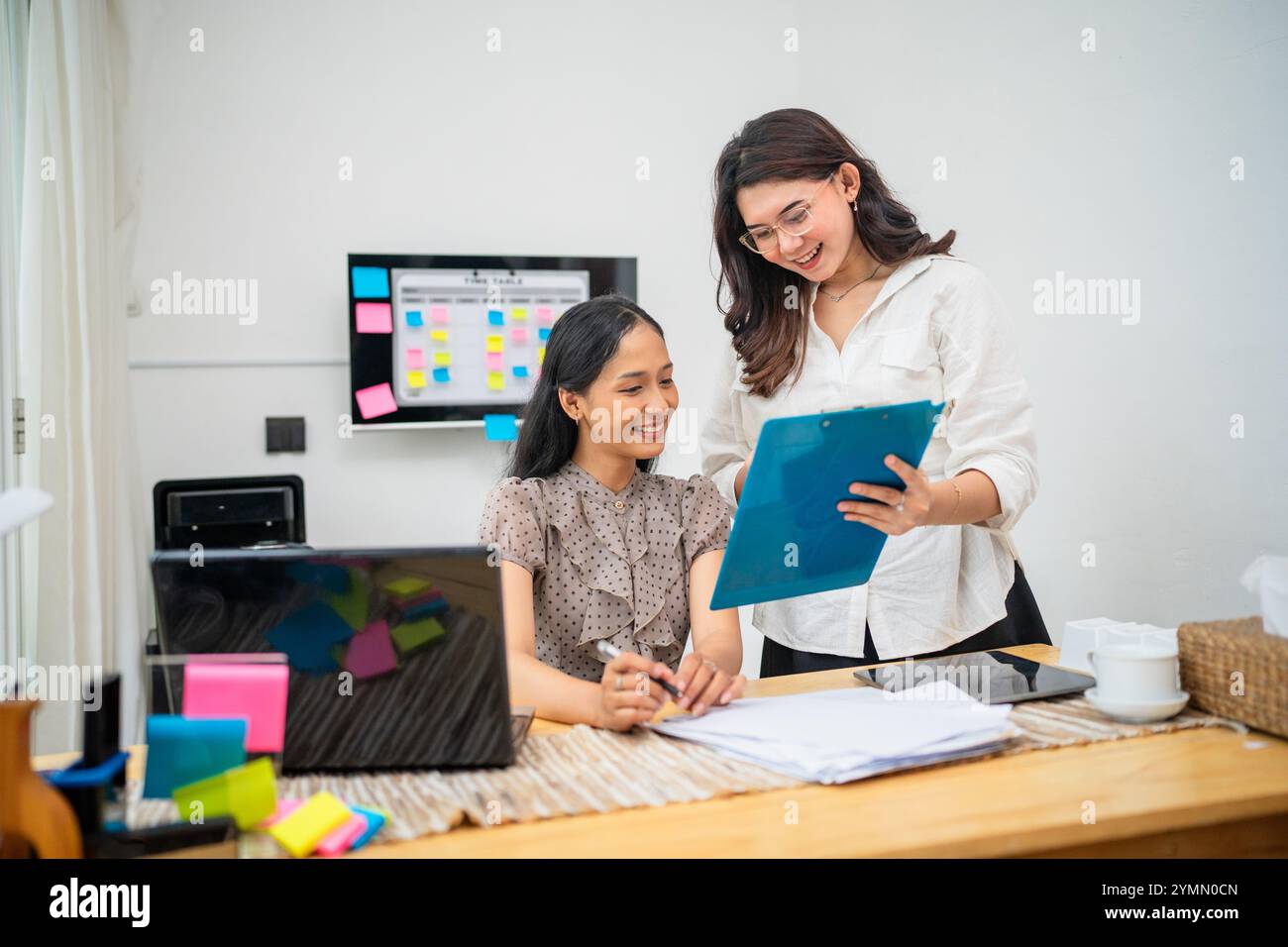 Collaborative Workspace: Engaging Team Meeting in Modern Office Setting ...
