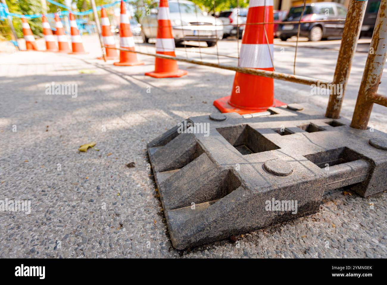 Barricade installed in front of building site next to city road with ...