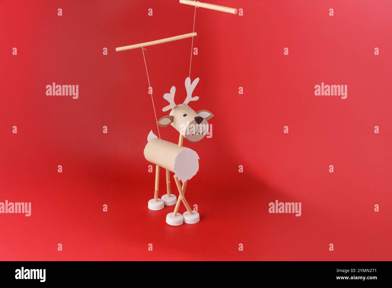 Step-by-step tutorial for DIY reindeer puppets made from cardboard ...