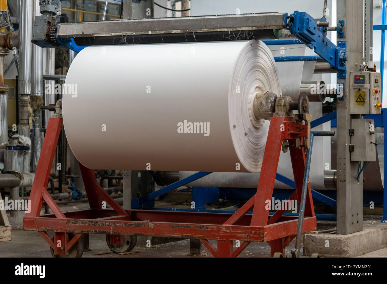 Fabric machine industrial plant line in a textile factory Stock Photo ...