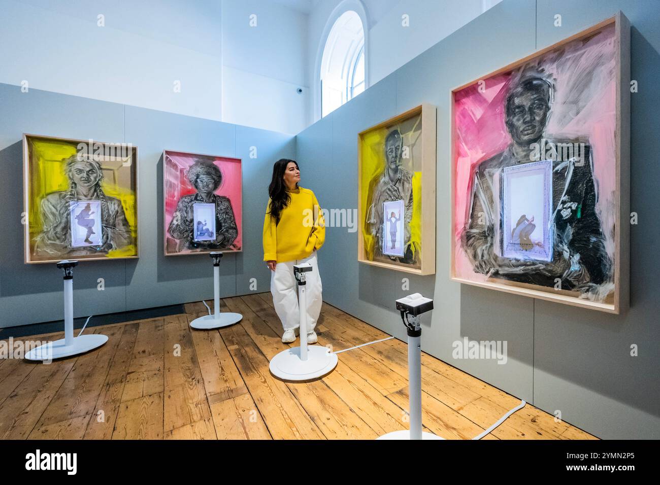 London, UK. 22 Nov 2024. The artist with her new works including Nizar ...