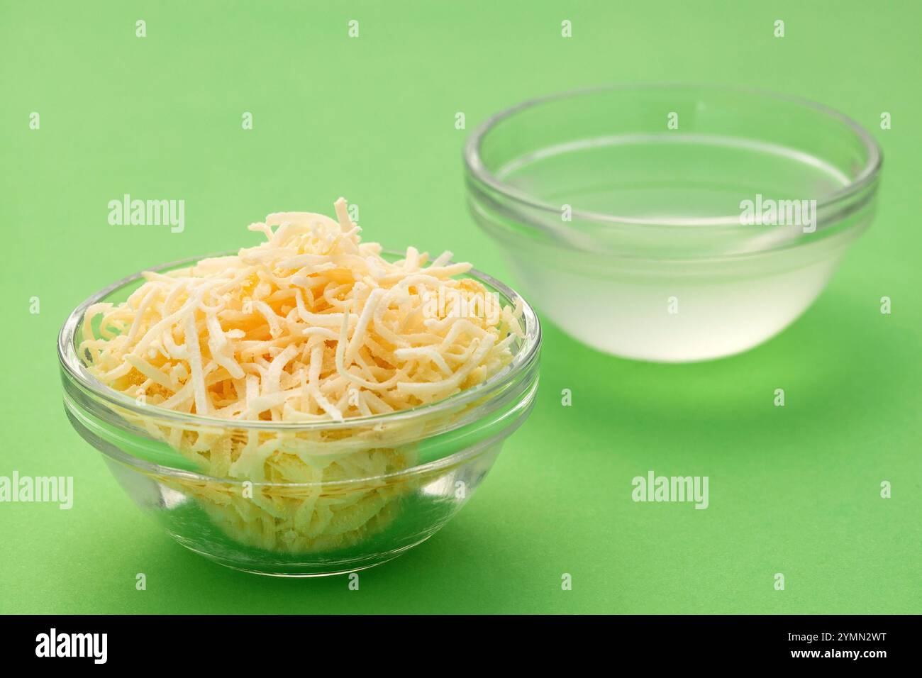Cocos nucifera - Organic coconut water in glass bowl Stock Photo - Alamy