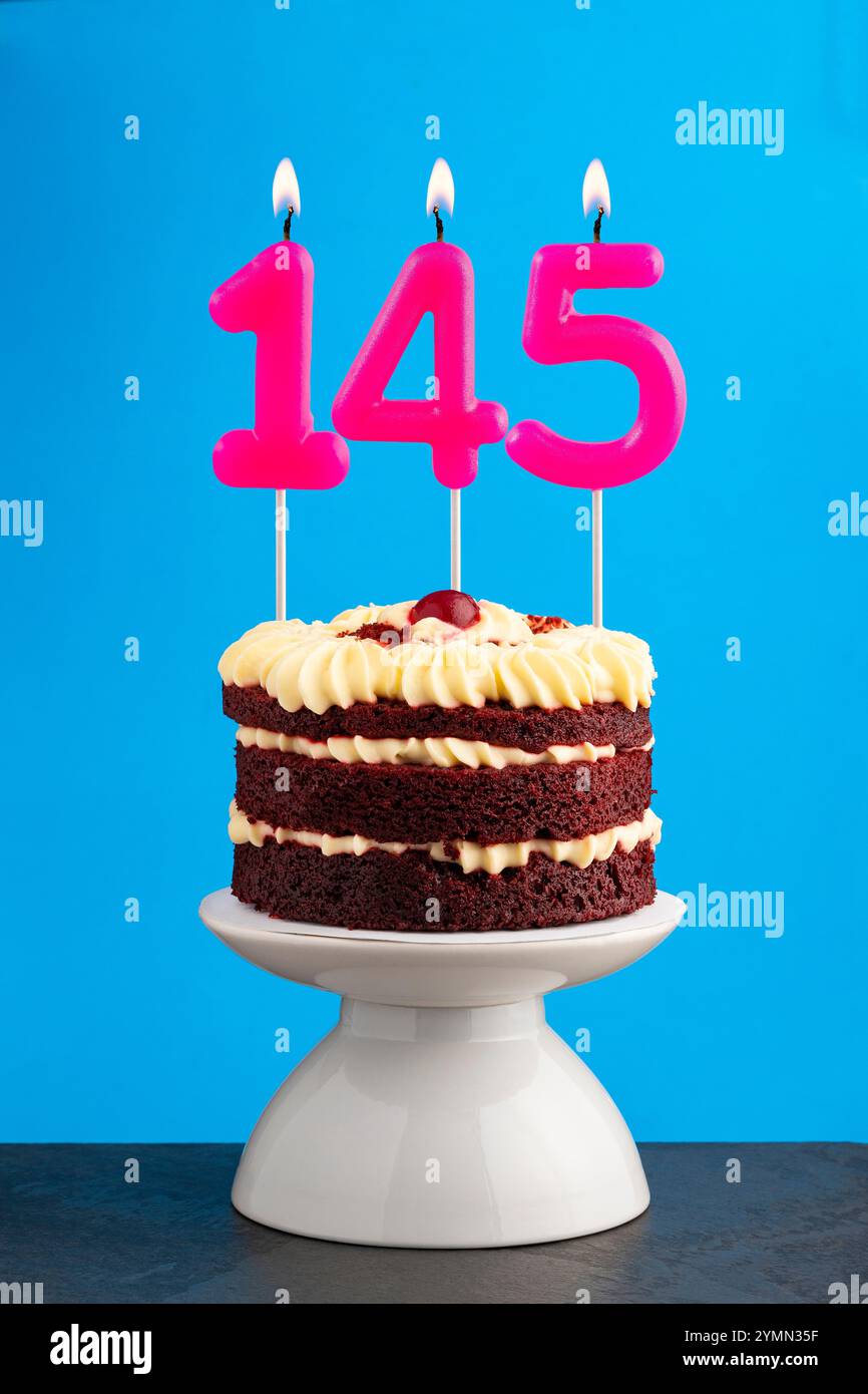 Birthday number 145 - Candle with red velvet cake Stock Photo - Alamy