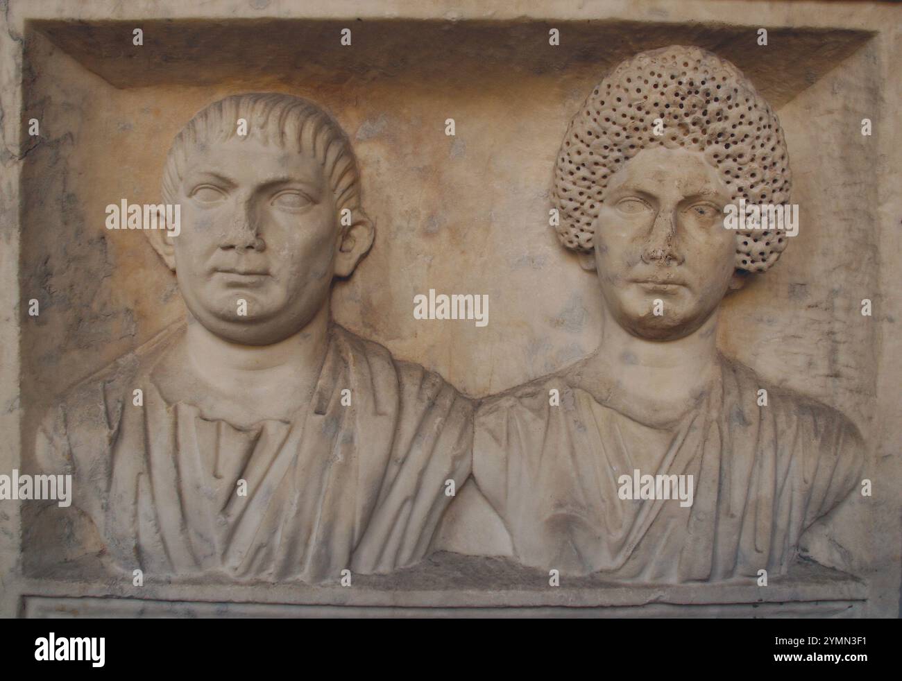 Roman era. Funerary relief of married couple. The woman with "Obis ...